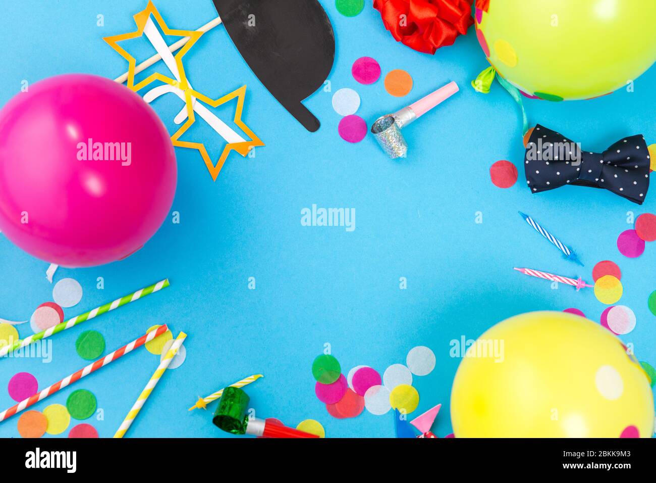 birthday party props, balloons and confetti Stock Photo - Alamy