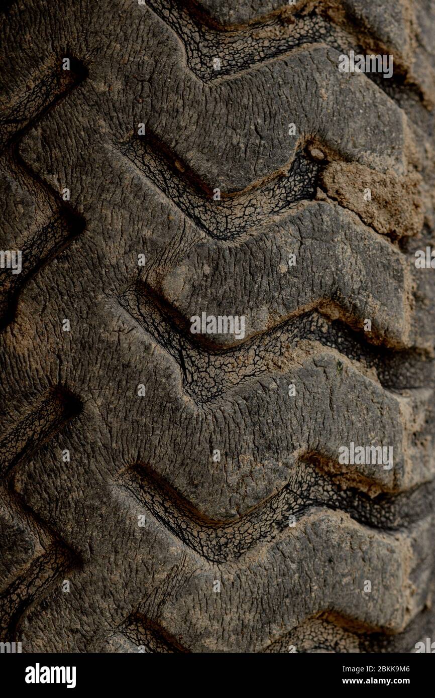 Detail of an old, cracked tractor tire Stock Photo - Alamy