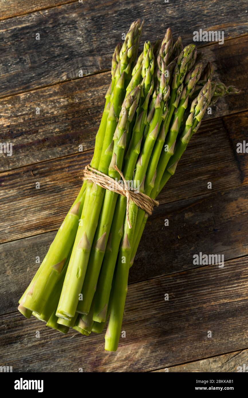 Raw Organic Green Asparagus Ready to Cook Stock Photo - Alamy