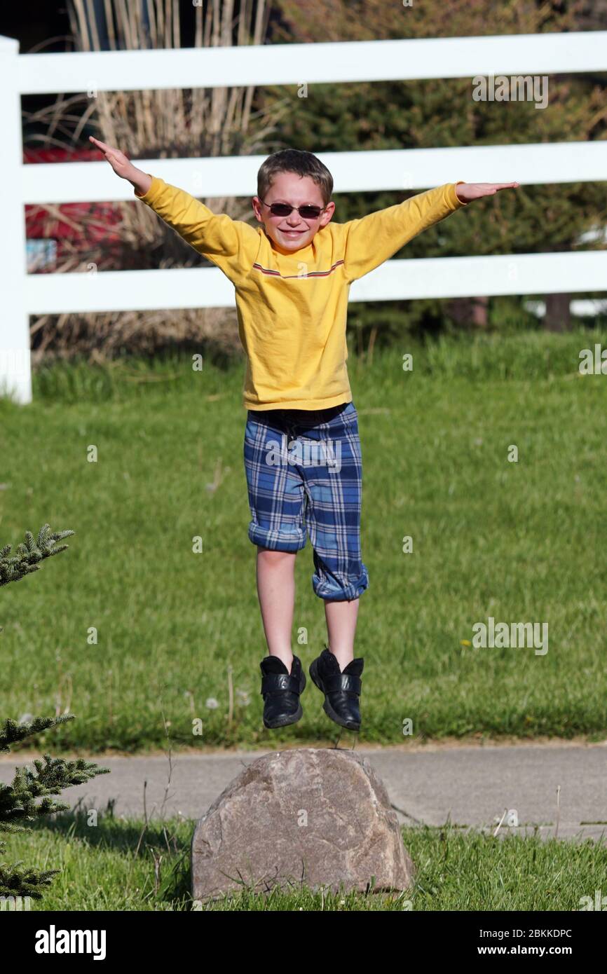 kids having fun during quarantine - boy takes flight Stock Photo - Alamy