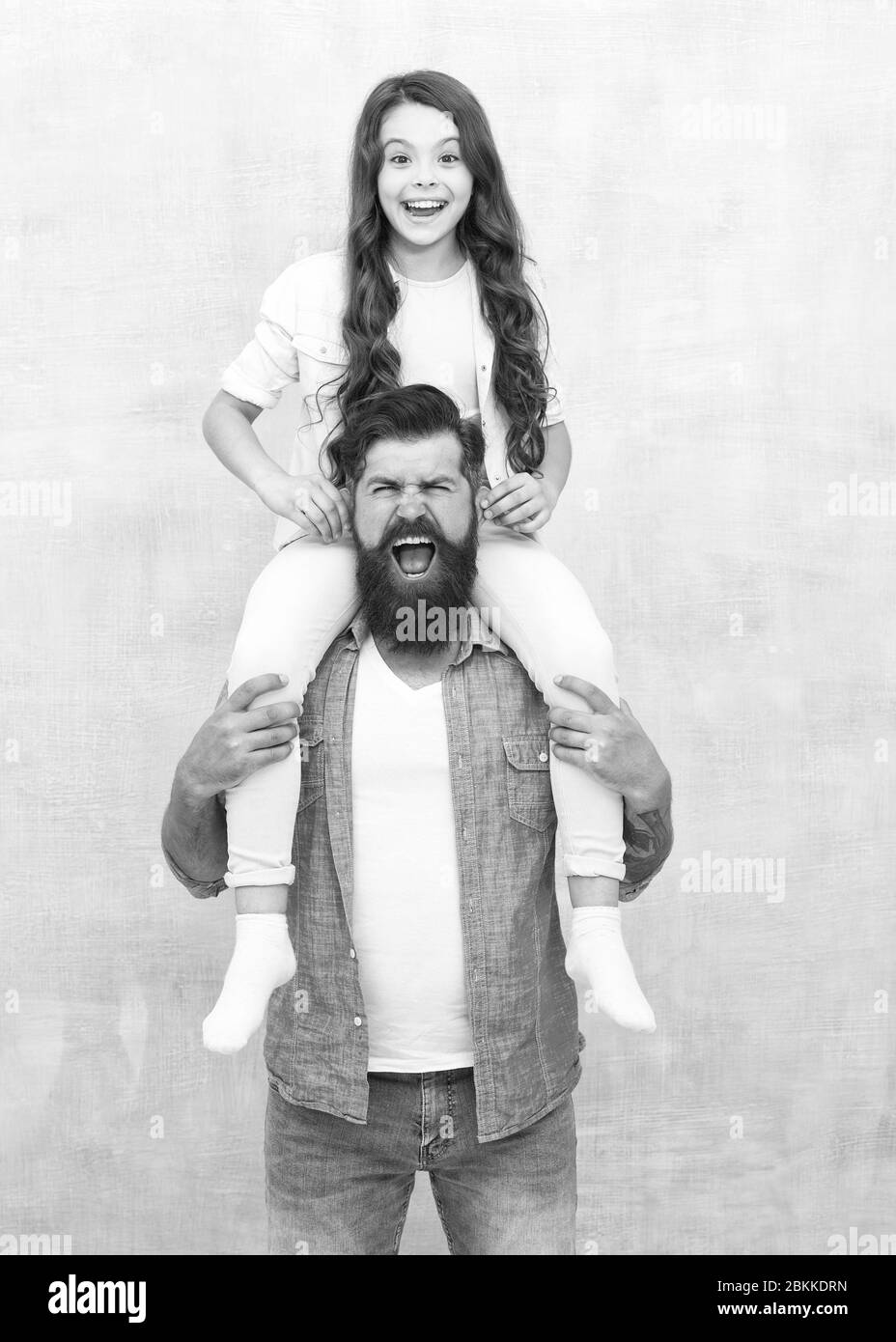 Enjoy the ride. Happy child. Small child and father. Bearded man carry ...