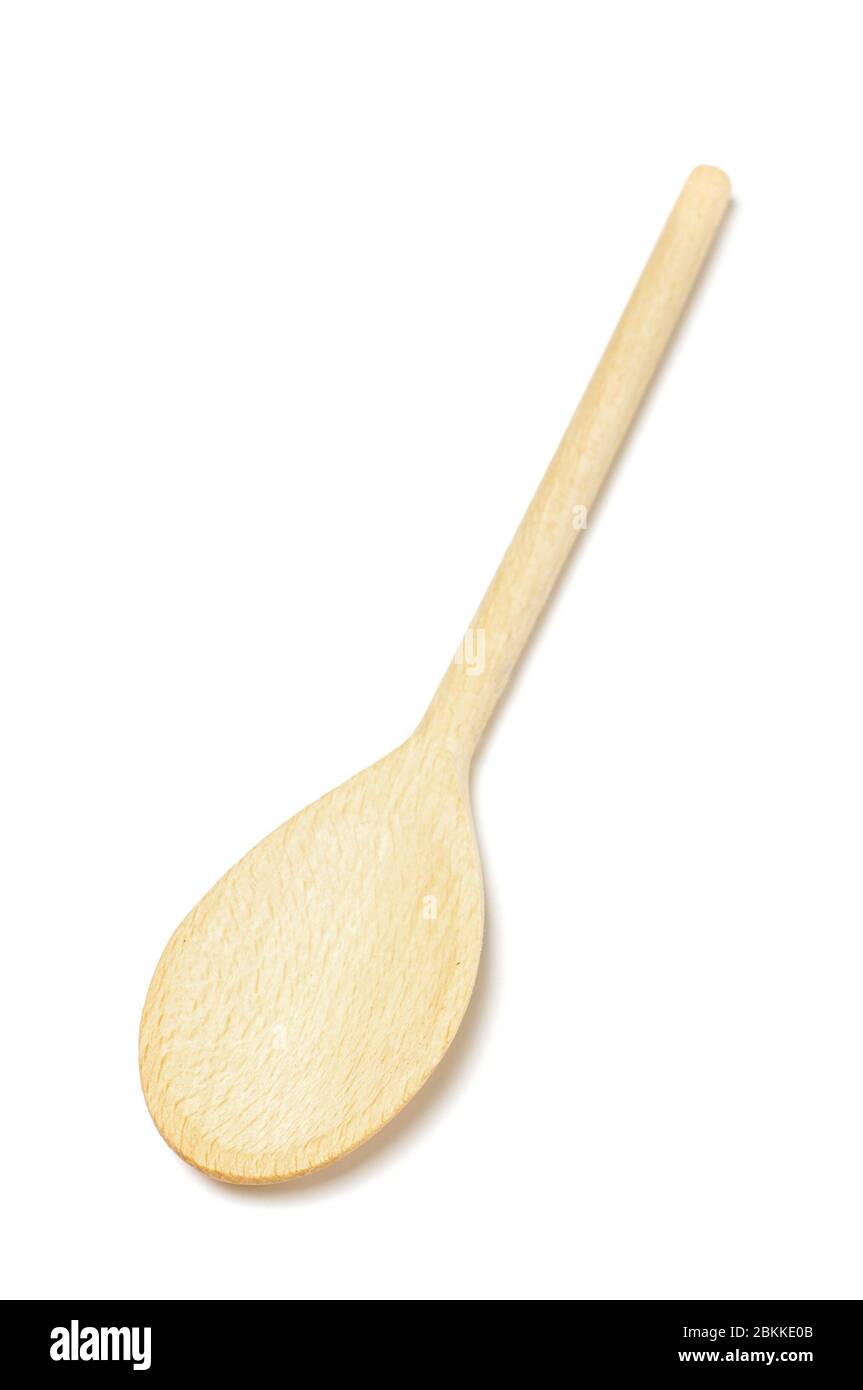 Decorative kitchen utensil spoon made from wood isolated on the white ...