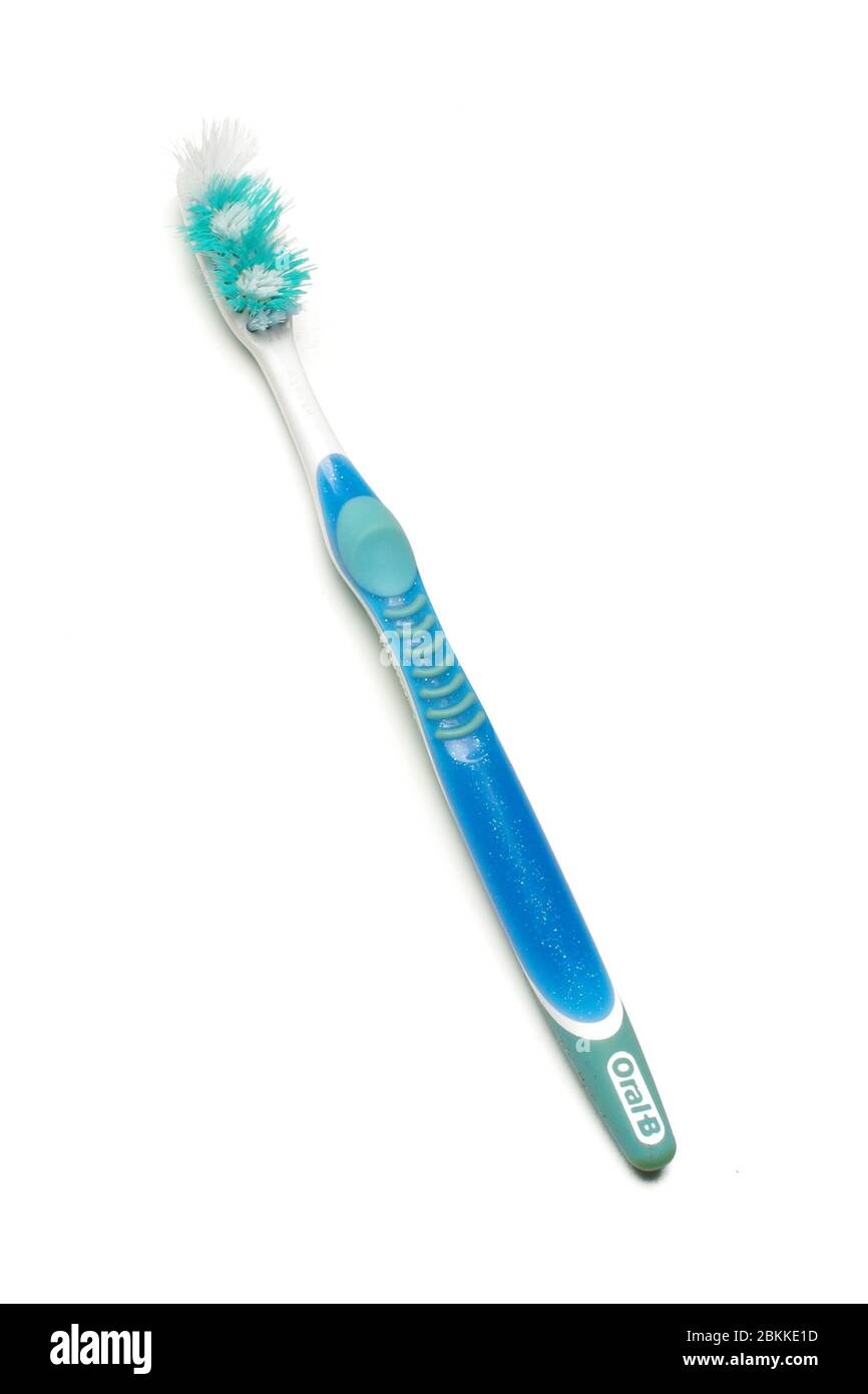 Used blue color toothbrush isolated on the white background Stock Photo ...