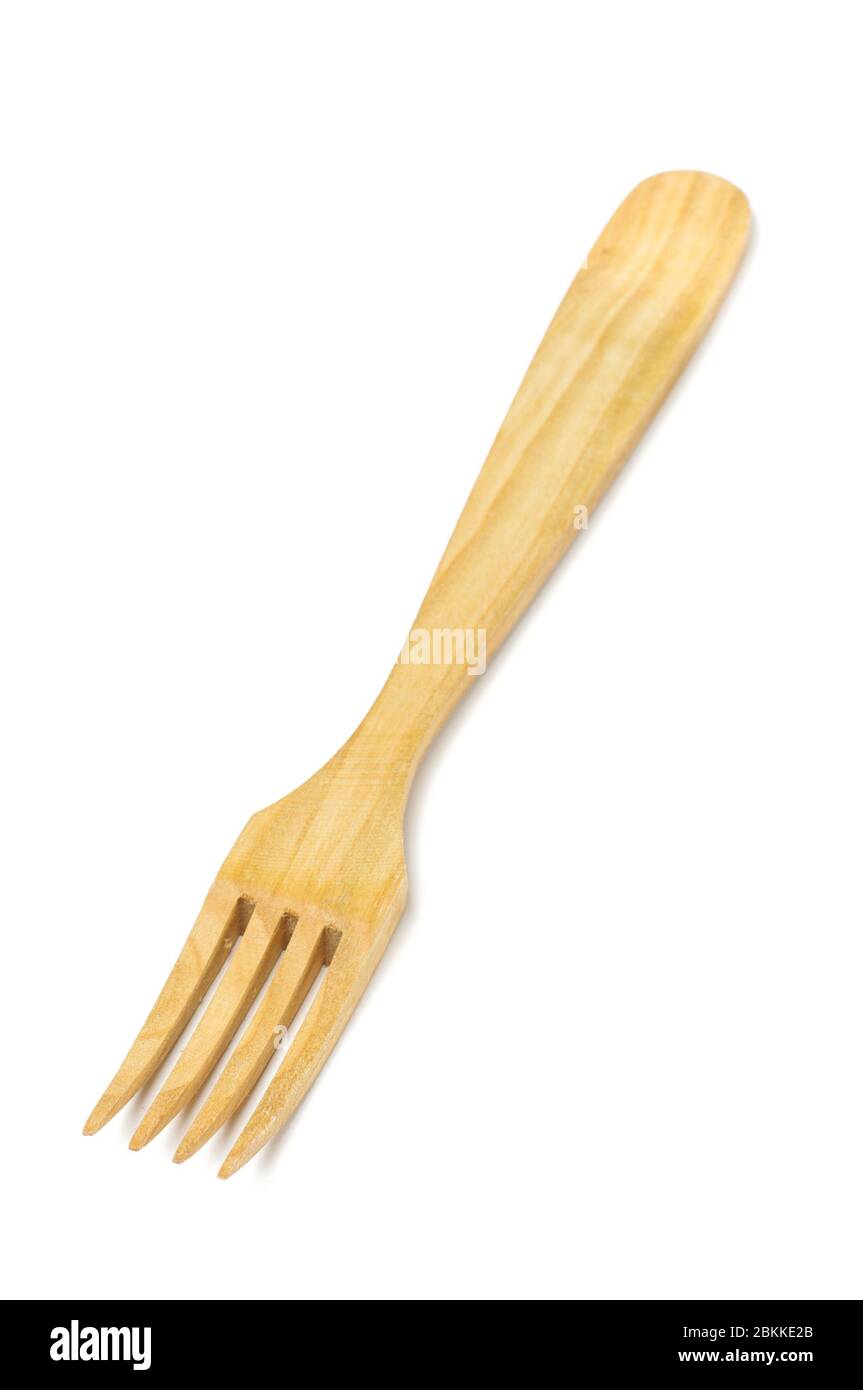 Decorative kitchen utensil fork made from wood isolated on the white ...