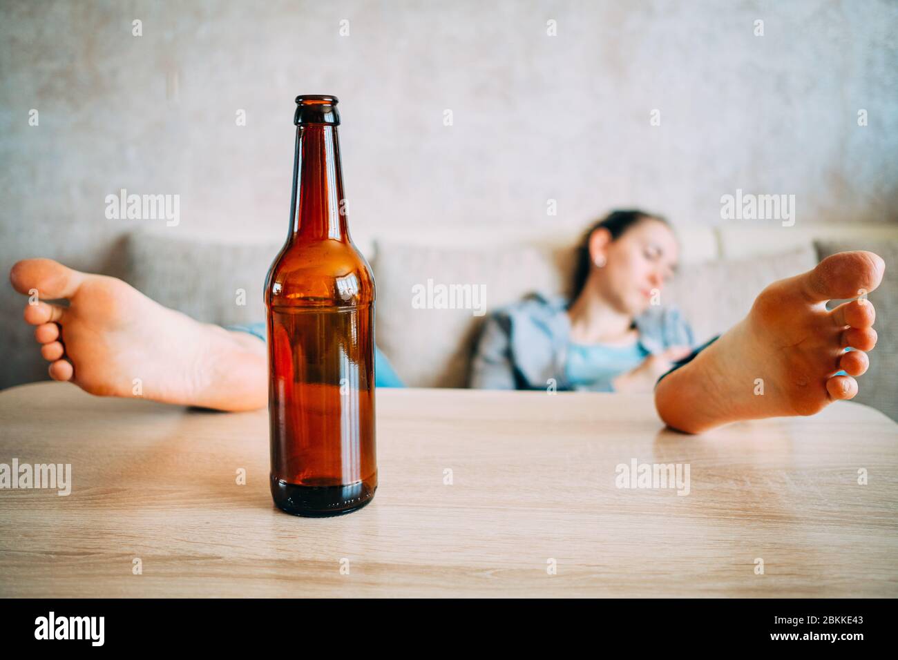 Woman sleeps up legs hi-res stock photography and images - Alamy
