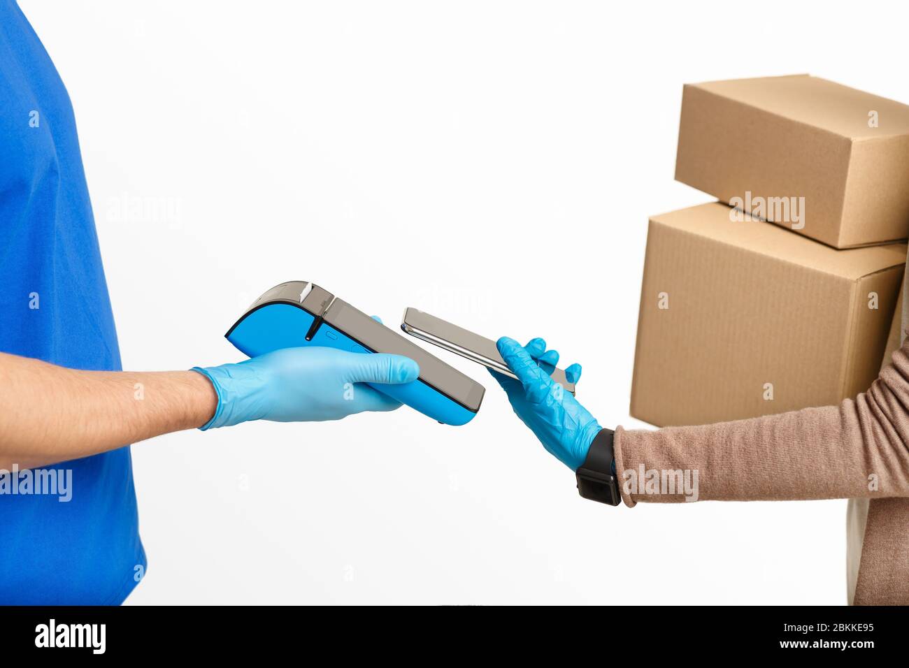 Modern methods of payment delivery of parcels Stock Photo - Alamy