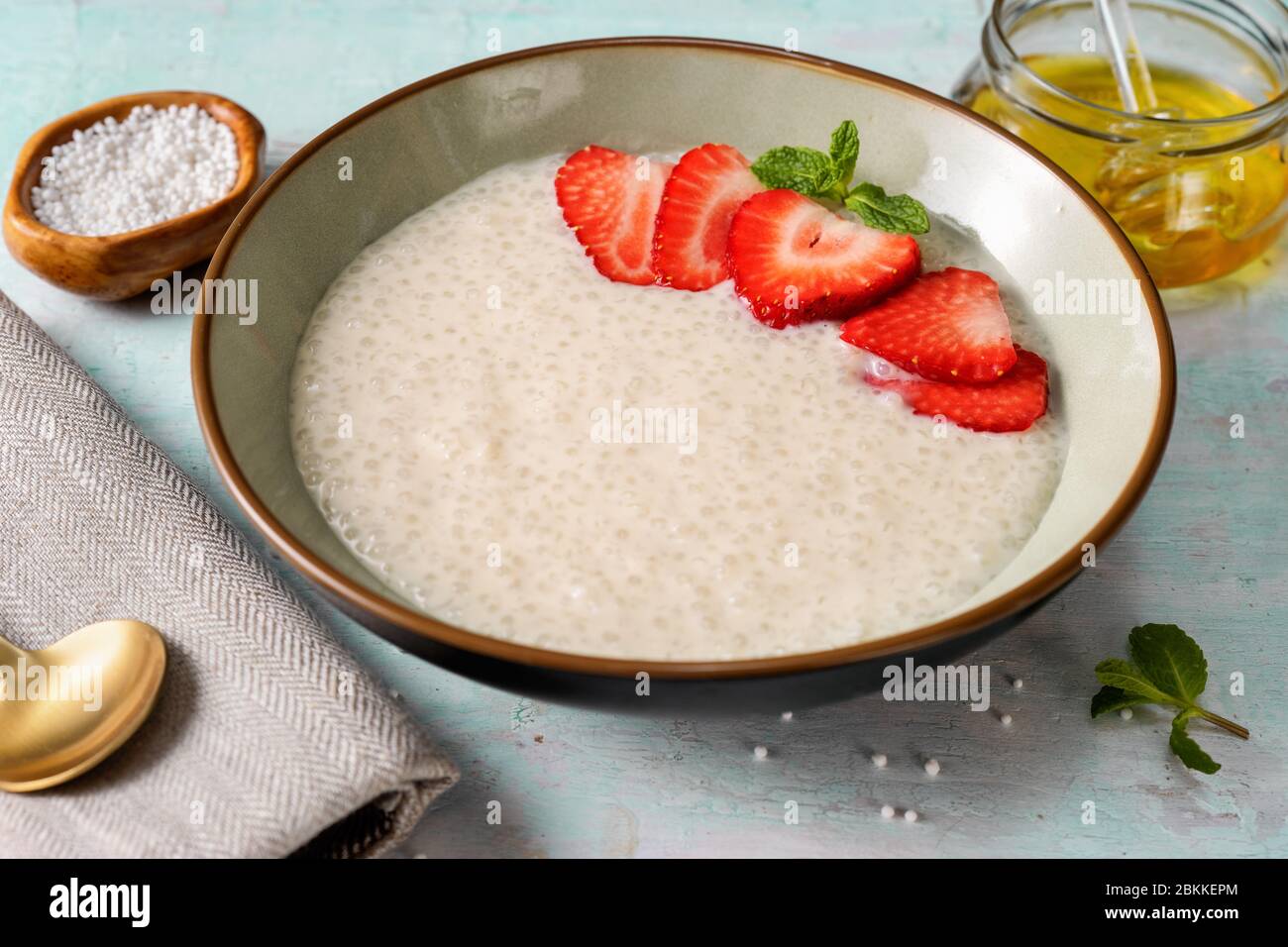 Vegan tapioca pudding in a plate on light blue background Stock Photo ...
