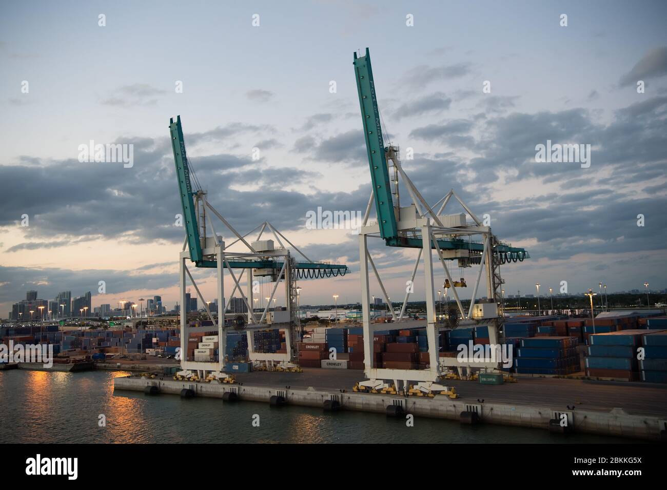 Miami, USA - March 01, 2016: cargo cranes on cloudy sky. Containers in ...