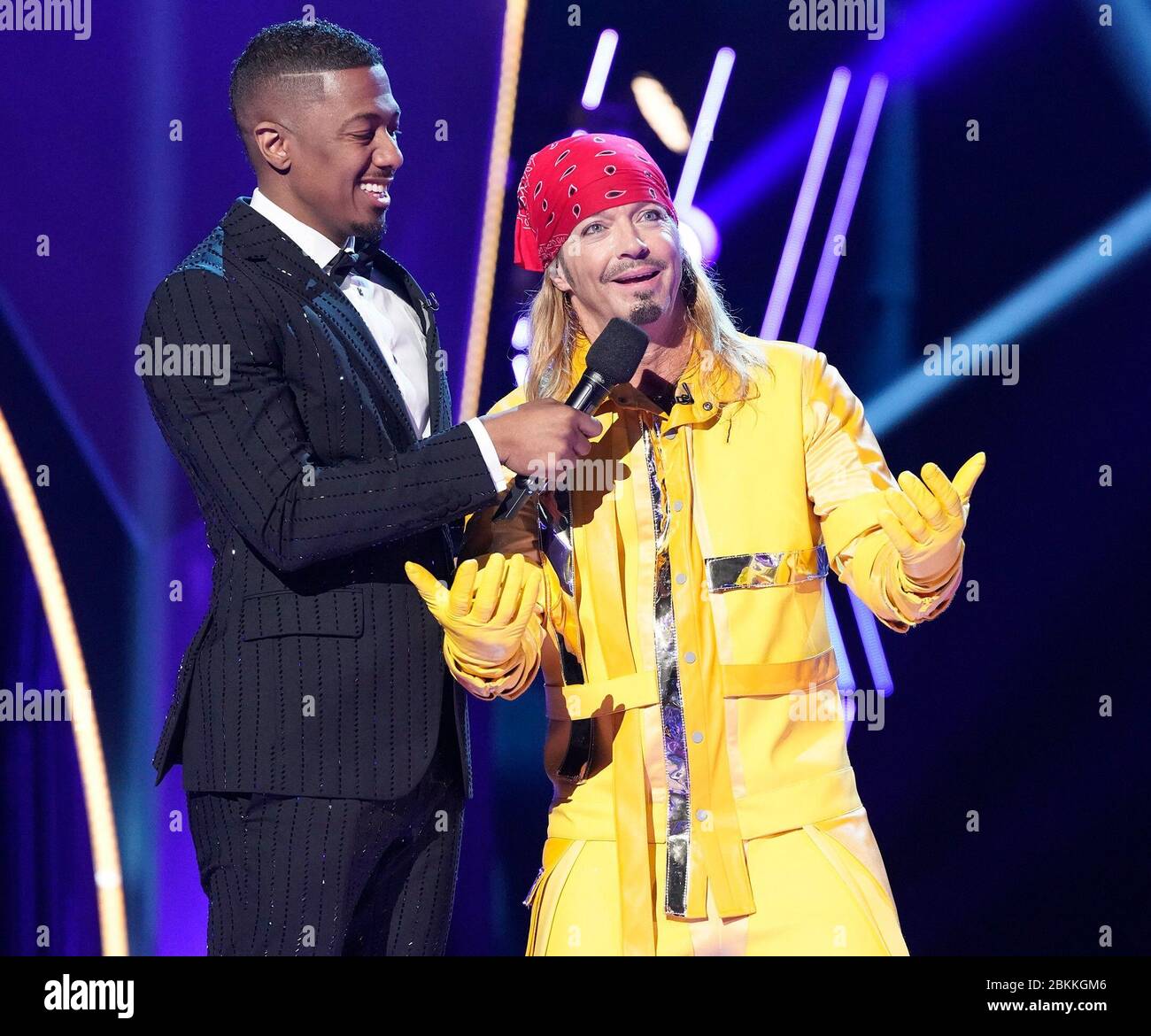 THE MASKED SINGER, from left: host Nick Cannon, Bret Michaels (revealed ...