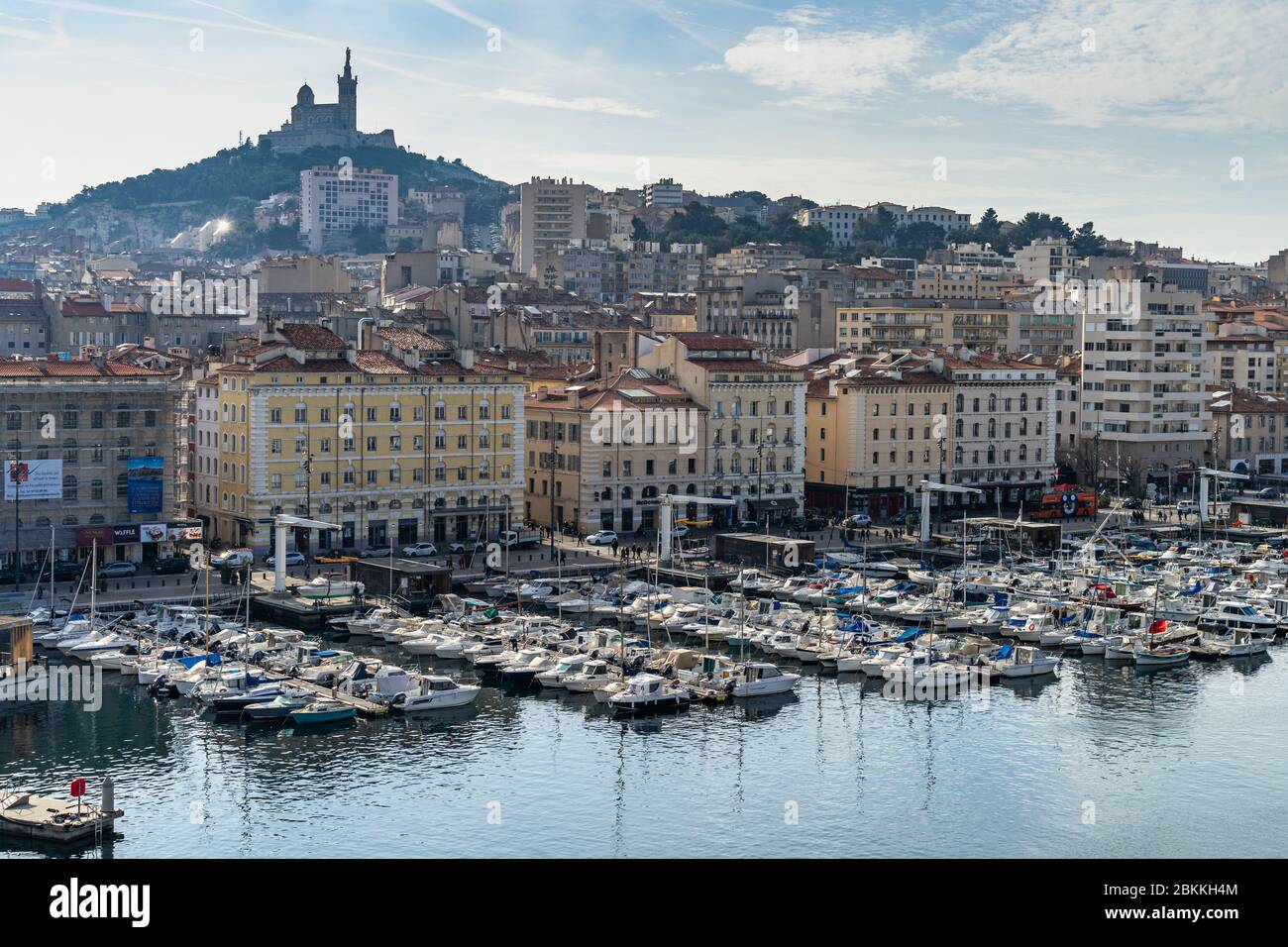 Scenic Marseille cityscape with Notre Dame del Garde basilica behind ...