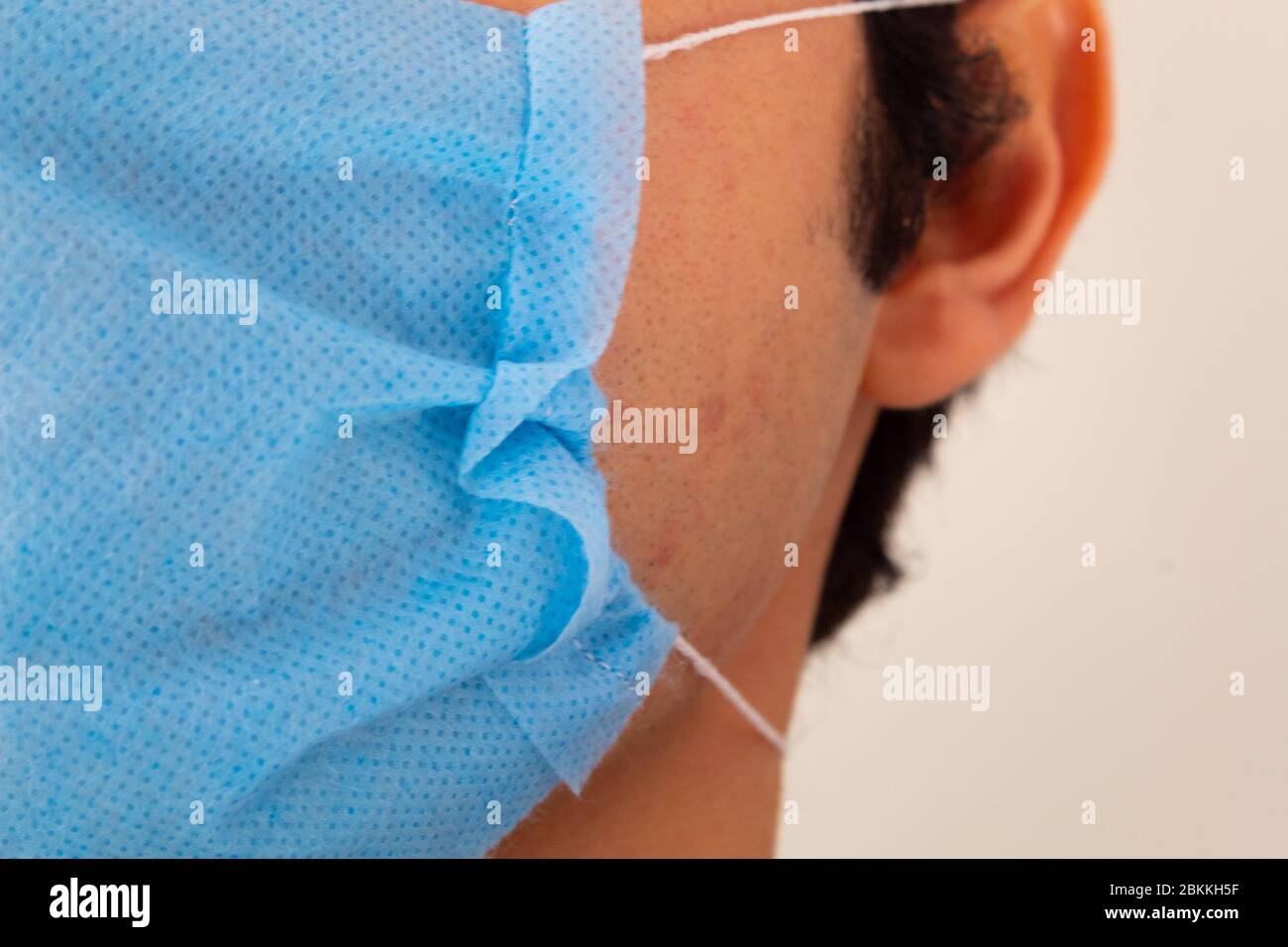 Close up blue medical face mask, suggested equipment to prevent ...