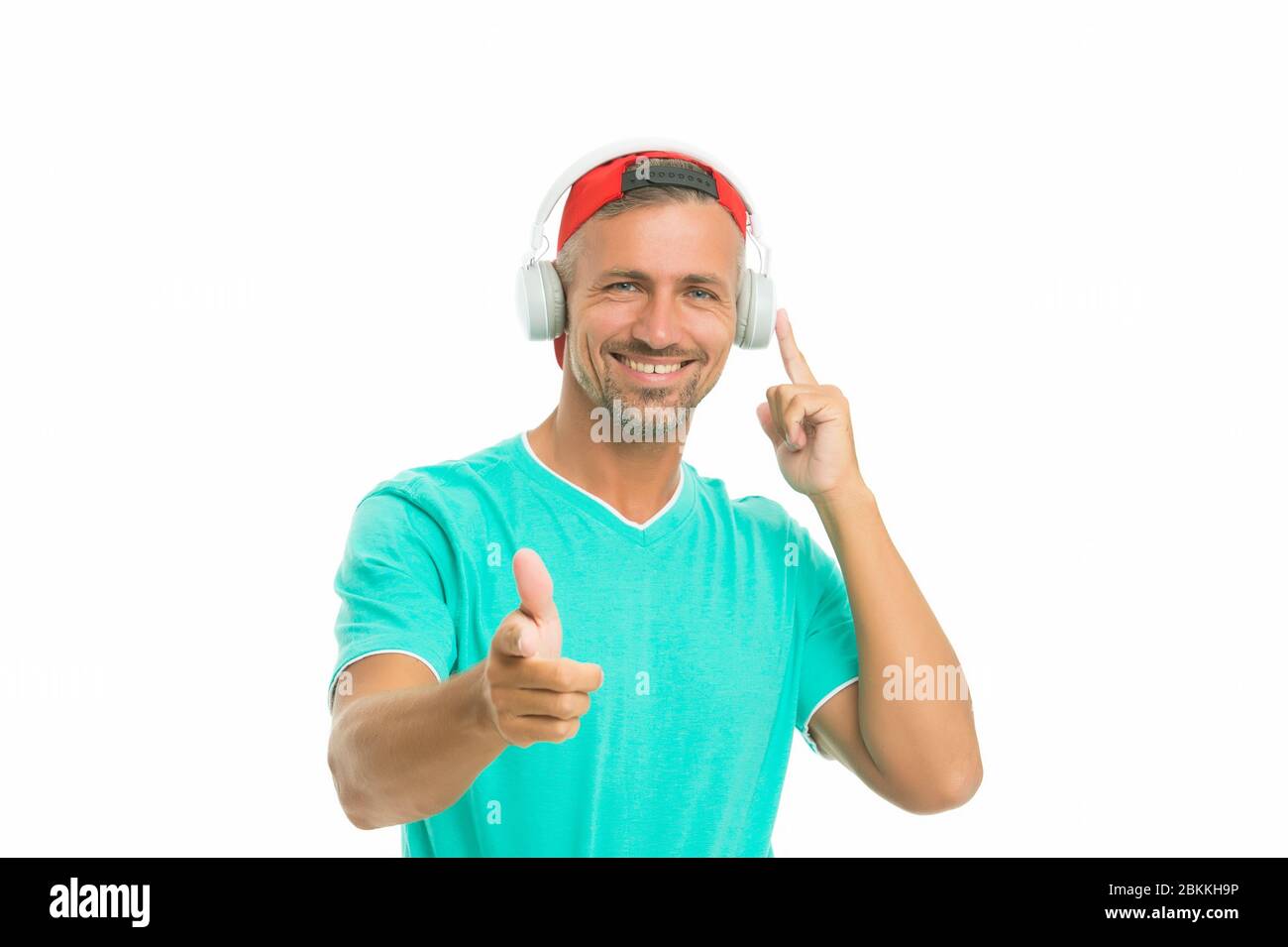 Join along. Happy man pointing straight isolated on white. Handsome guy ...