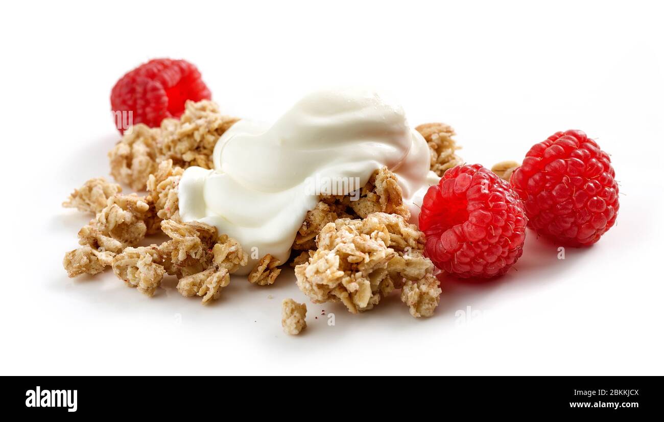 muesli with raspberries an yogurt isolated on white background Stock ...