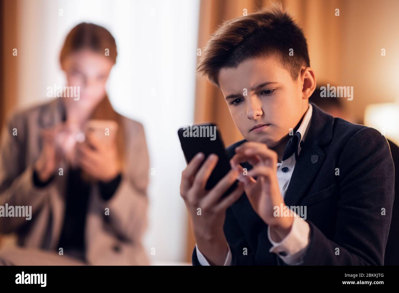 Teenage Family Using Gadgets. Modern Technology Concept Stock Photo - Alamy