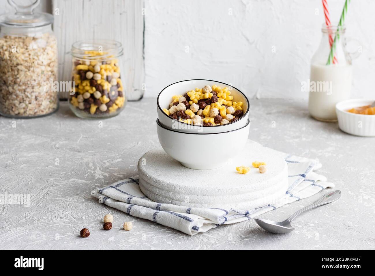 Assorted breakfast cereals: chocolate balls and honey stars Stock Photo ...