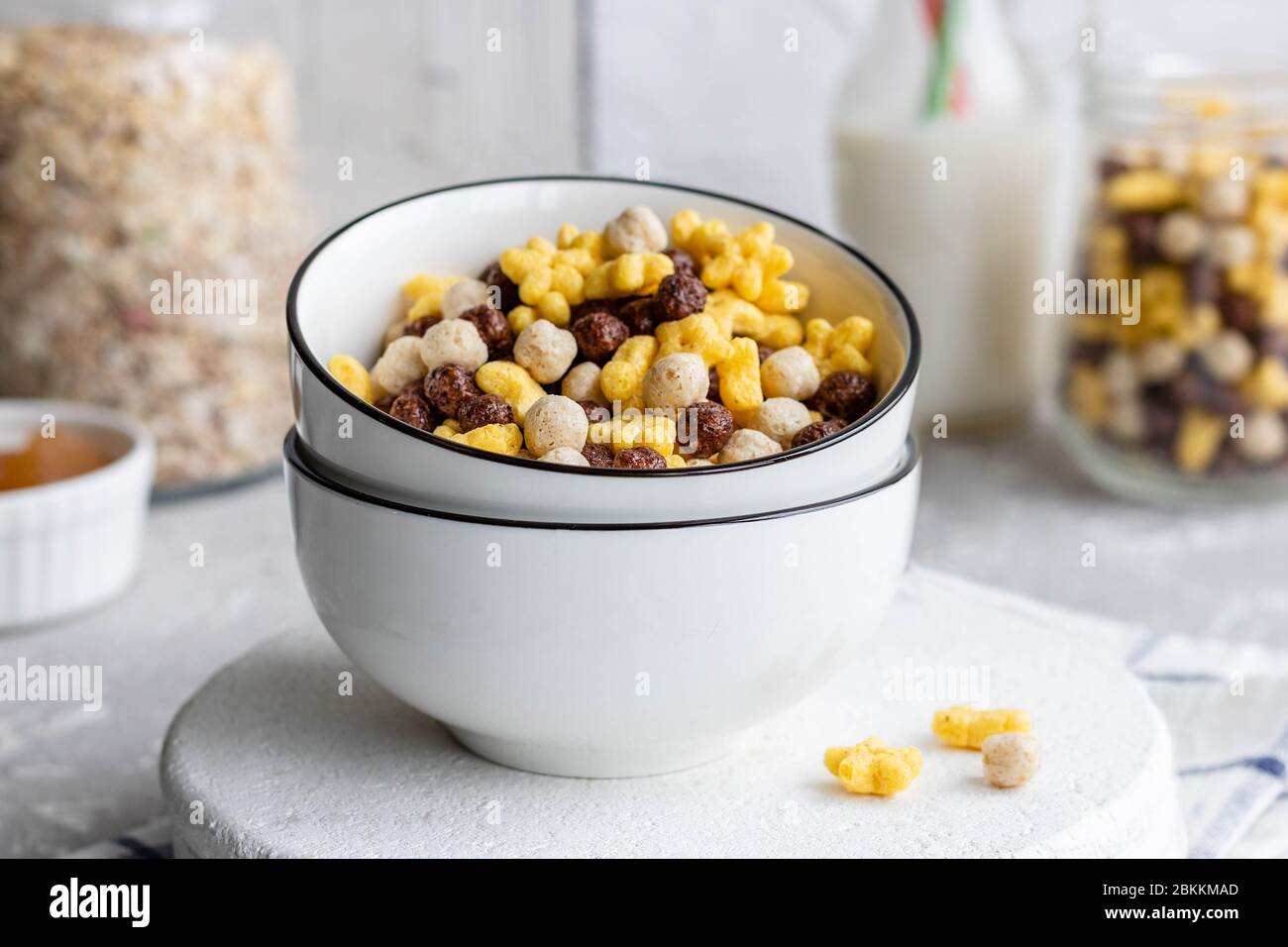 Assorted breakfast cereals: chocolate balls and honey stars Stock Photo ...