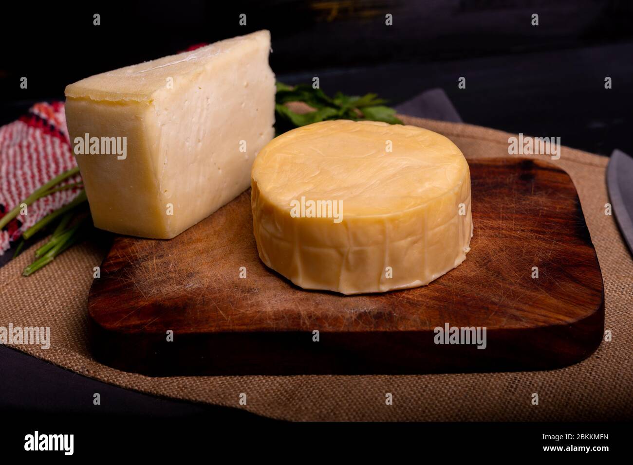 Delicious cheese in a wheel ready to eat or enjoy in an afternoon with ...