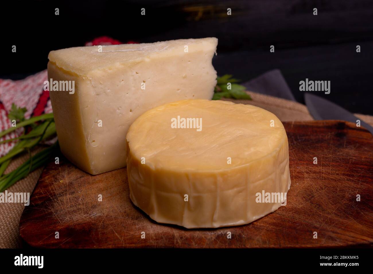Delicious cheese in a wheel ready to eat or enjoy in an afternoon with ...