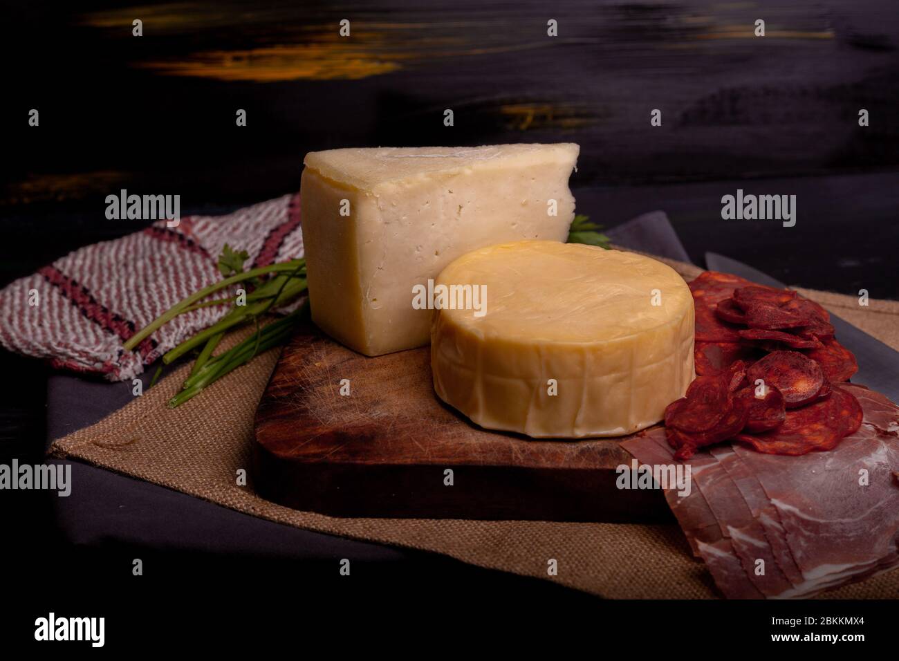 Delicious cheese in a wheel ready to eat or enjoy in an afternoon with ...