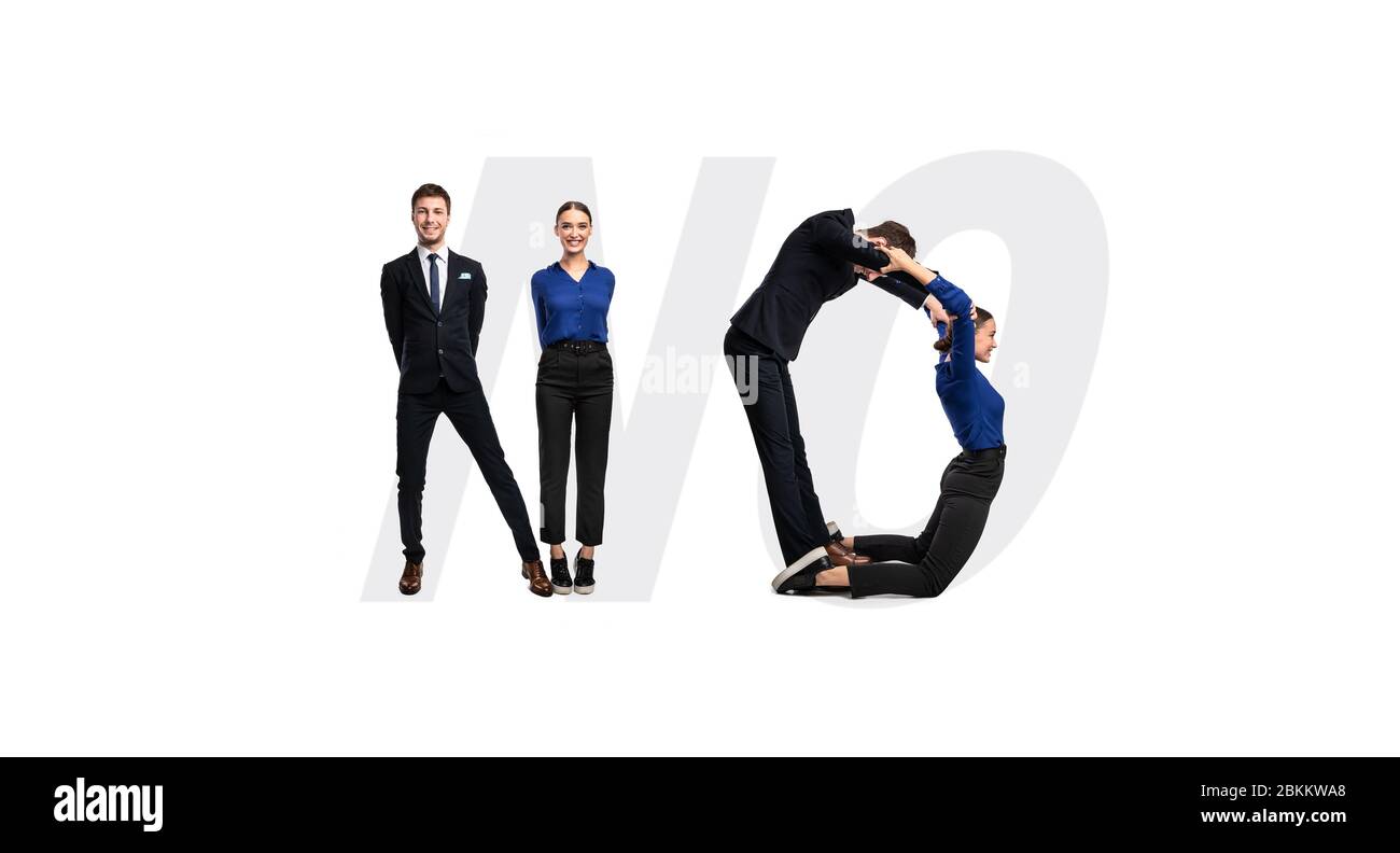 Group of people forming no word at studio Stock Photo - Alamy