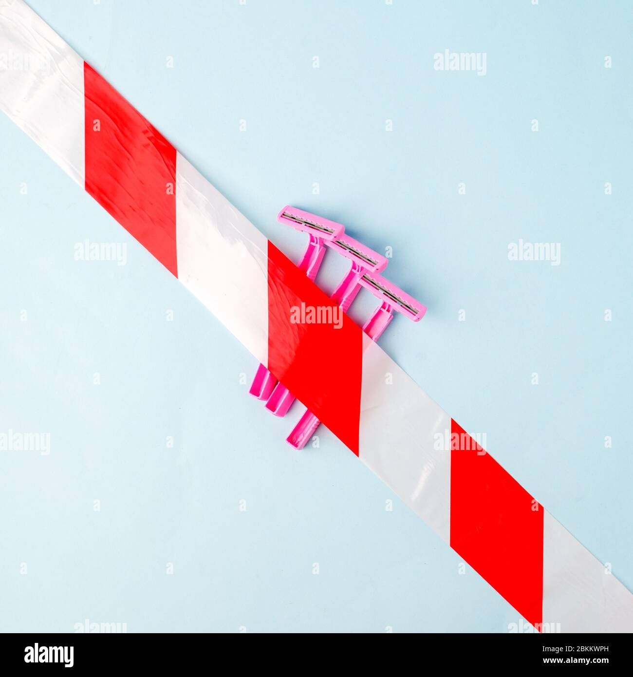 Shaving razors and stop sign on pink background, concept of skincare ...