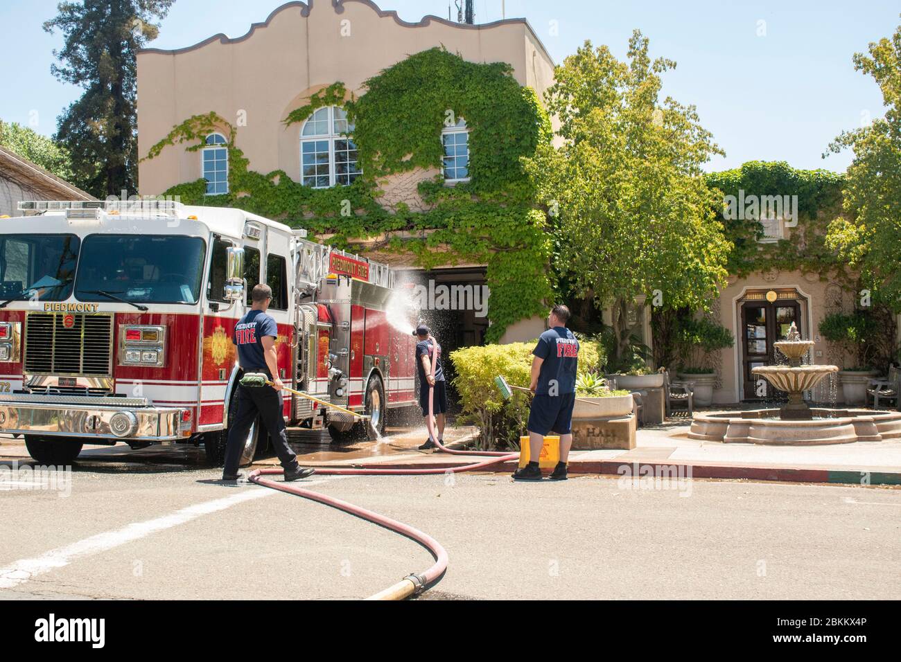 Firemen wash their firetruck at the fire station in Piedmont, CA Stock ...