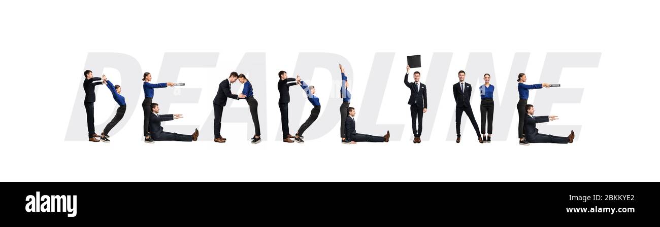 Group of people forming deadline word at studio Stock Photo - Alamy