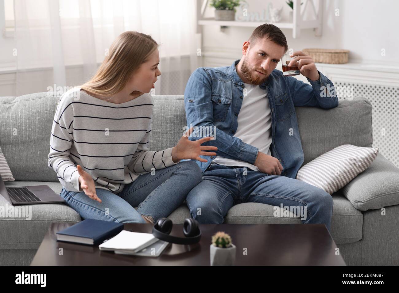 Furious woman shouting at her drunk husband at home Stock Photo - Alamy