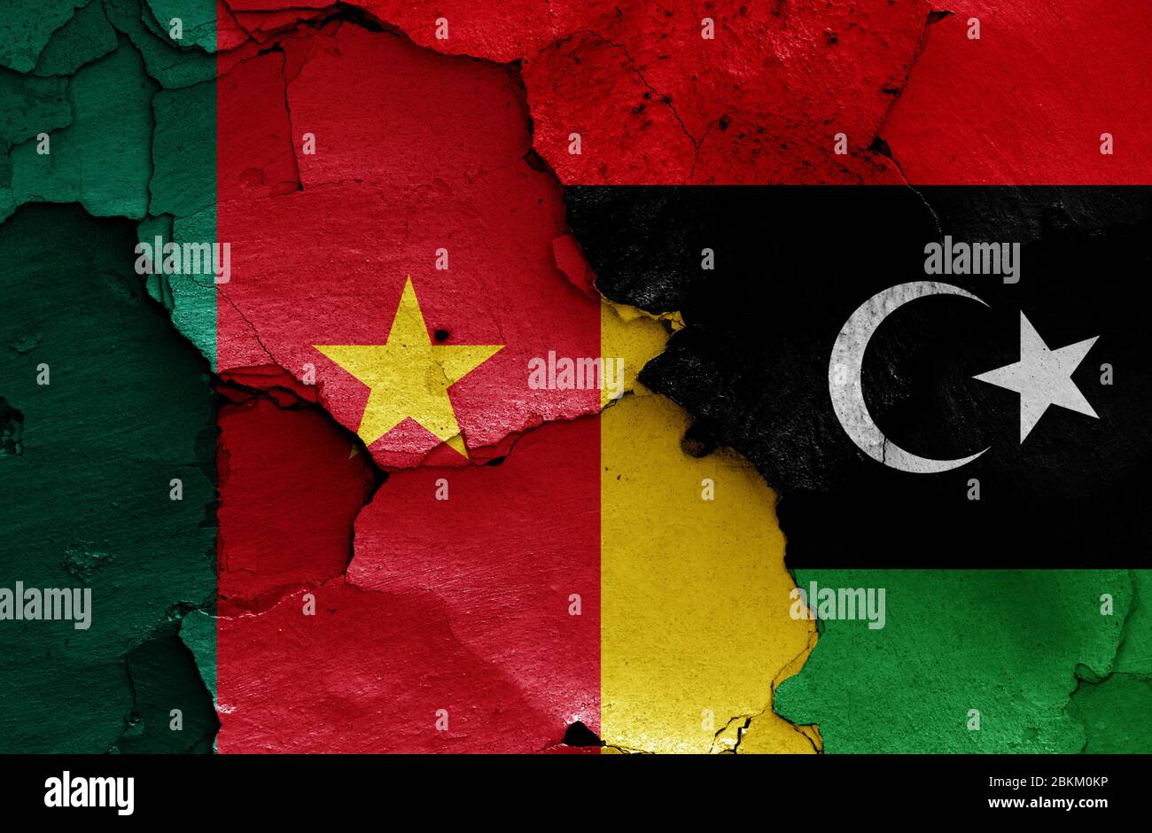 flags of Cameroon and Libya painted on cracked wall Stock Photo - Alamy