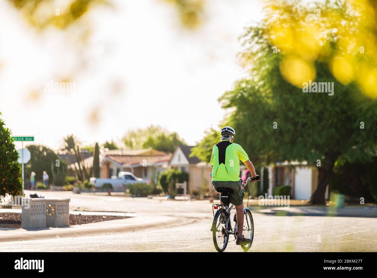 Old man riding bicycle hi-res stock photography and images - Alamy
