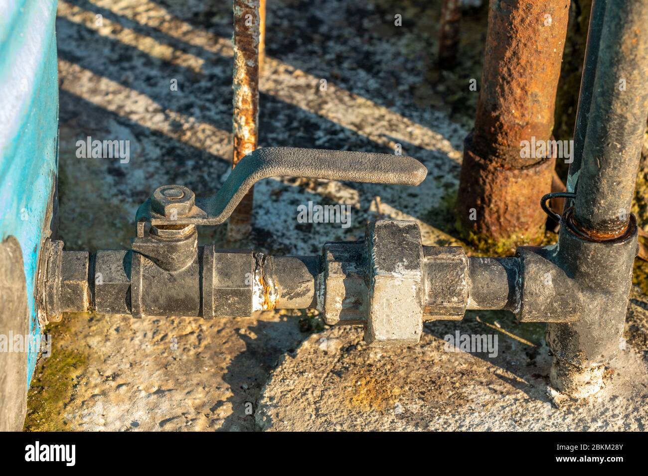 Water Pipe Value fitted with water tank Stock Photo - Alamy