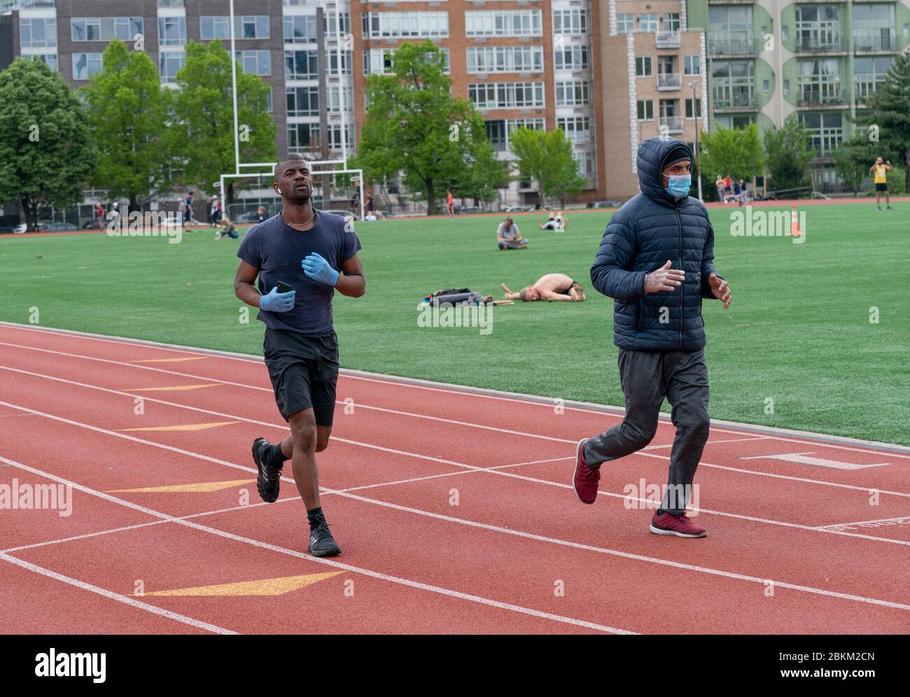 New York, NY - May 4, 2020: People exercise while keeping social ...