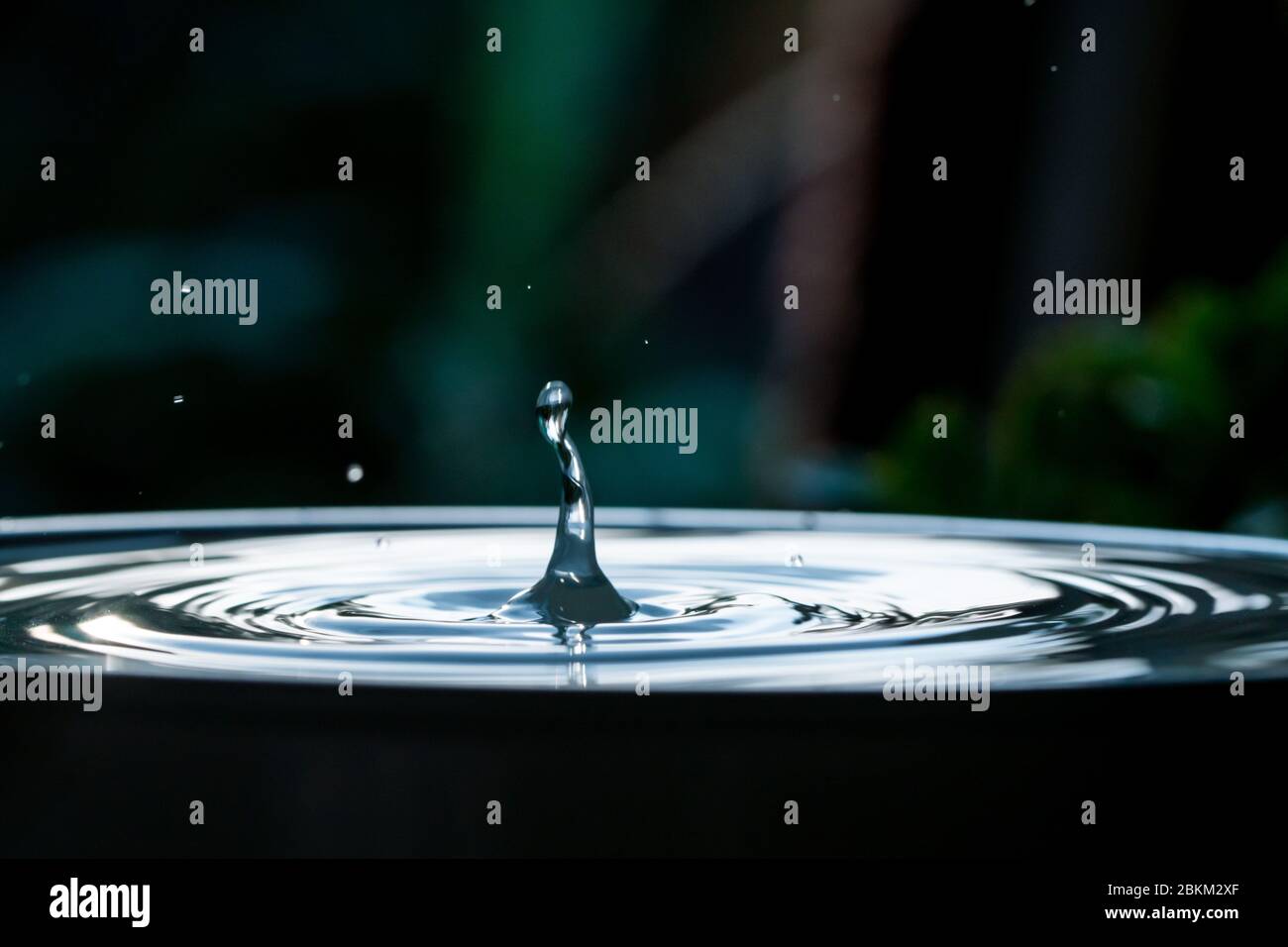 Water Drop splash with sun Stock Photo - Alamy
