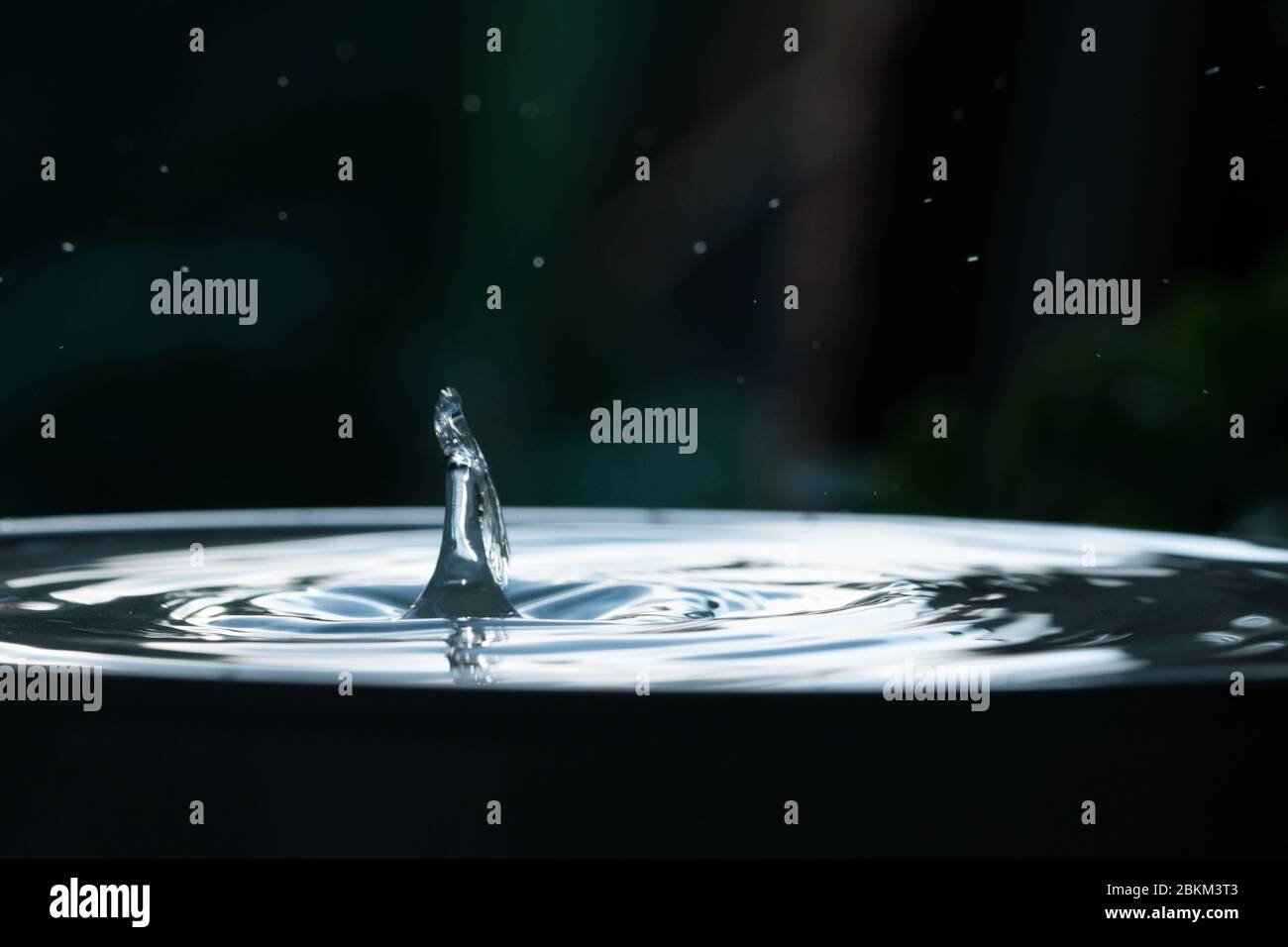 Water Drop splash with sun Stock Photo - Alamy