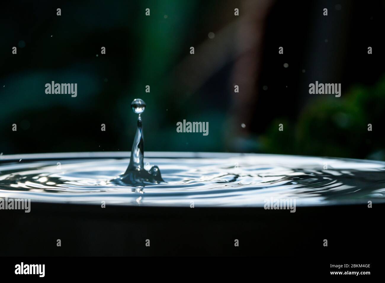 Water Drop splash with sun Stock Photo - Alamy