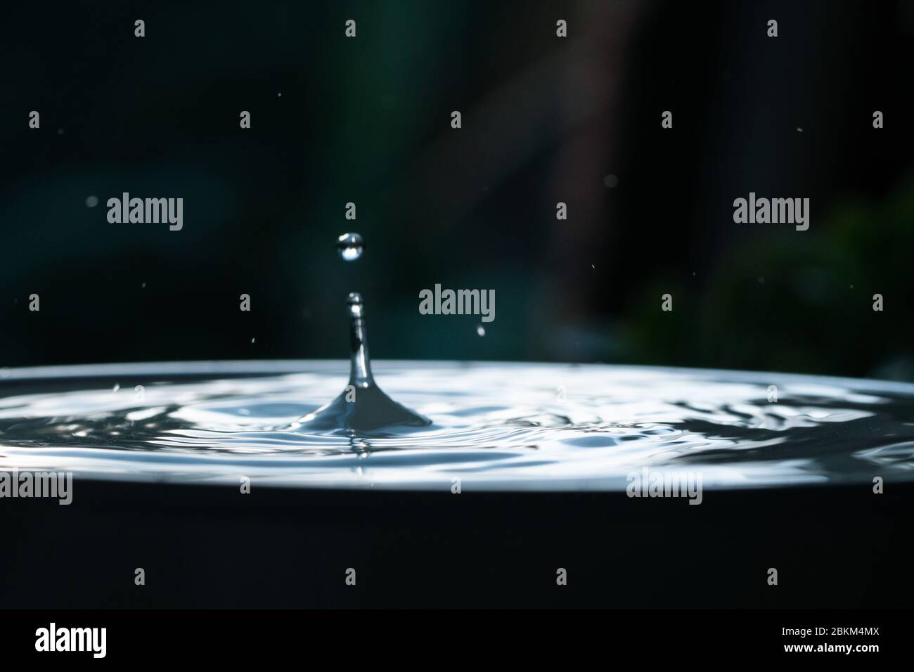 Water Drop splash with sun Stock Photo - Alamy