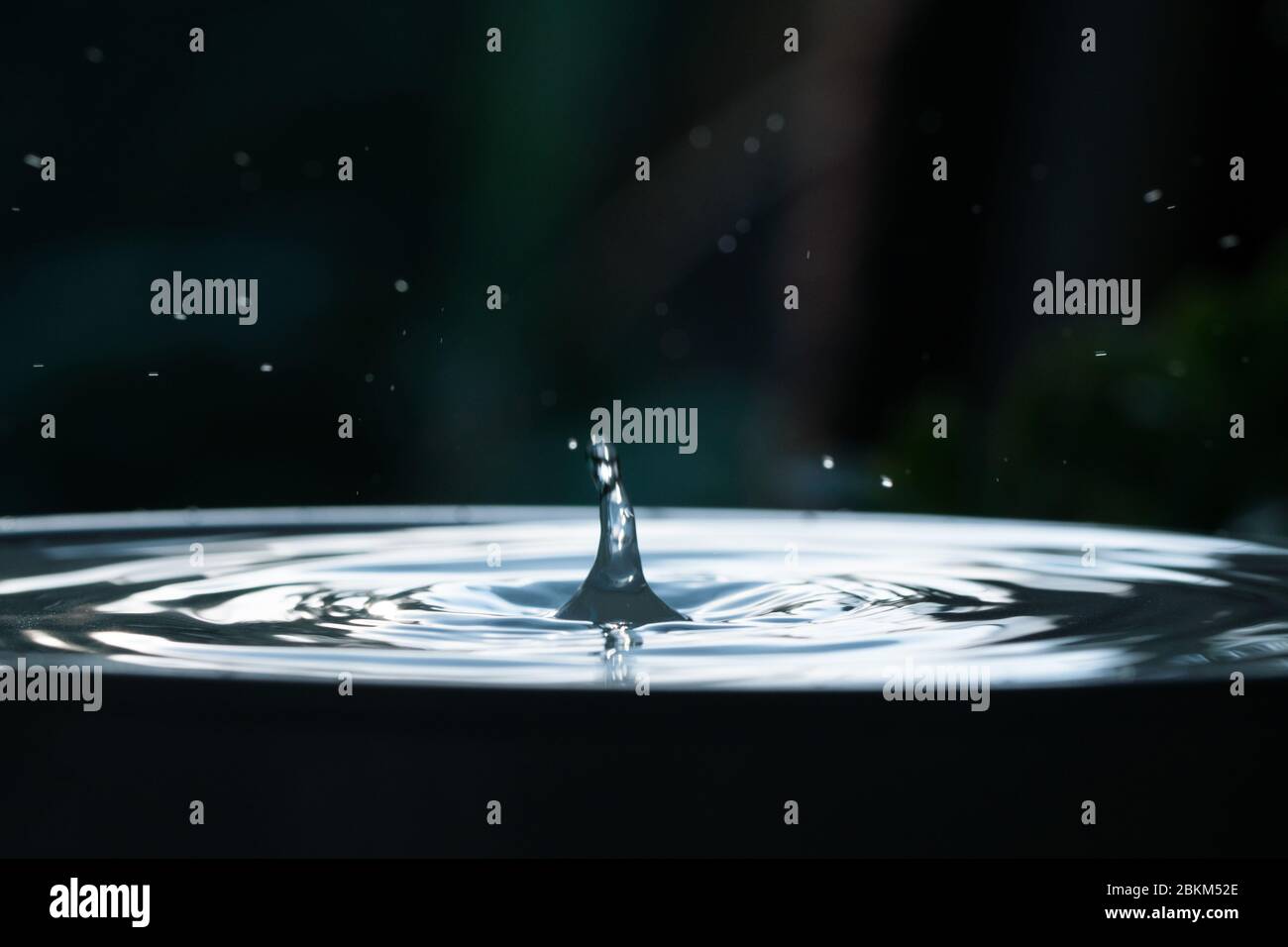 Water Drop splash with sun Stock Photo - Alamy