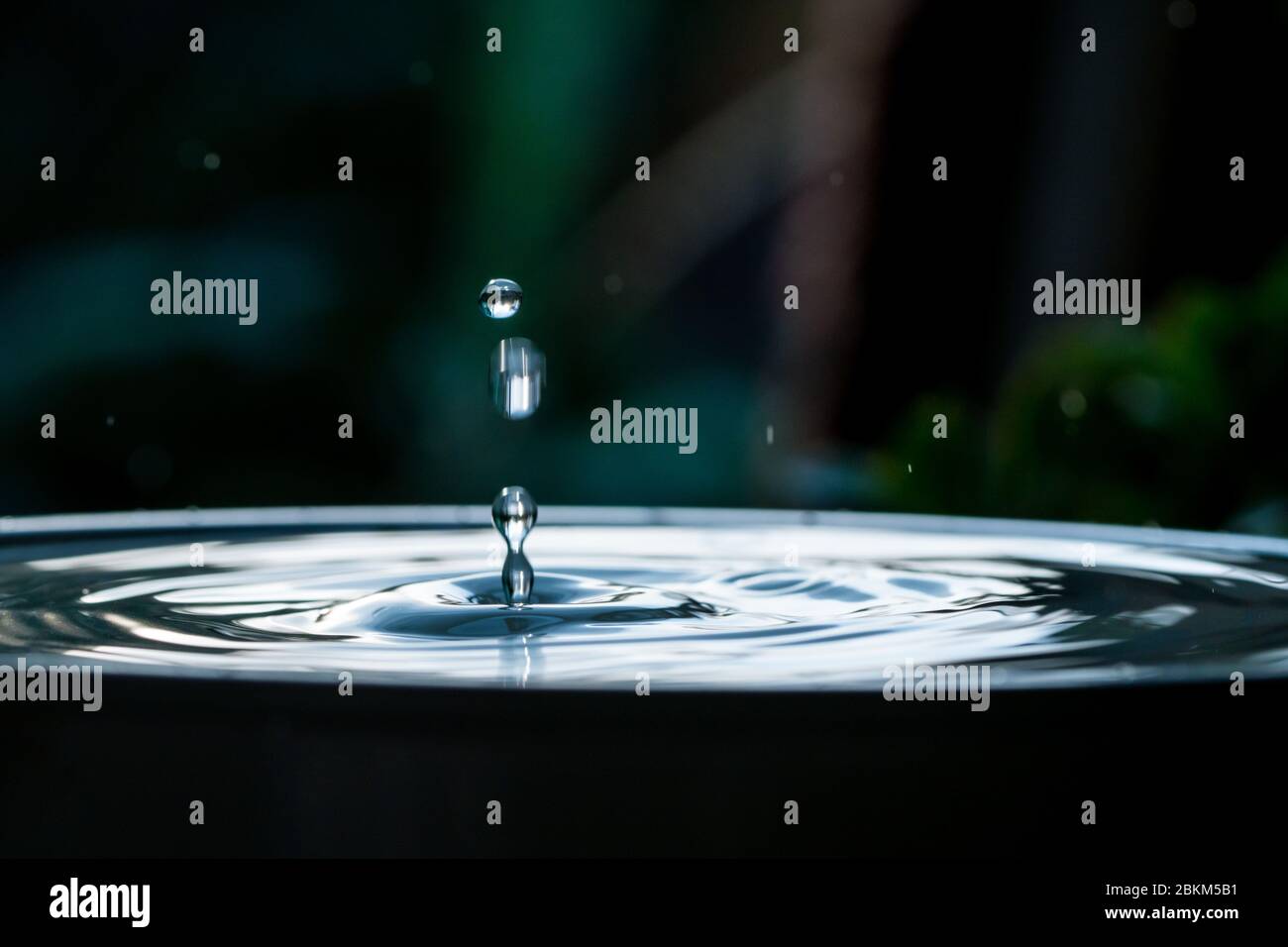 Water Drop splash with sun Stock Photo - Alamy