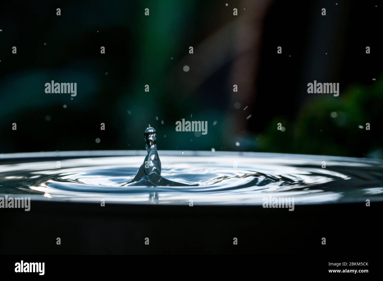 Water Drop splash with sun Stock Photo - Alamy