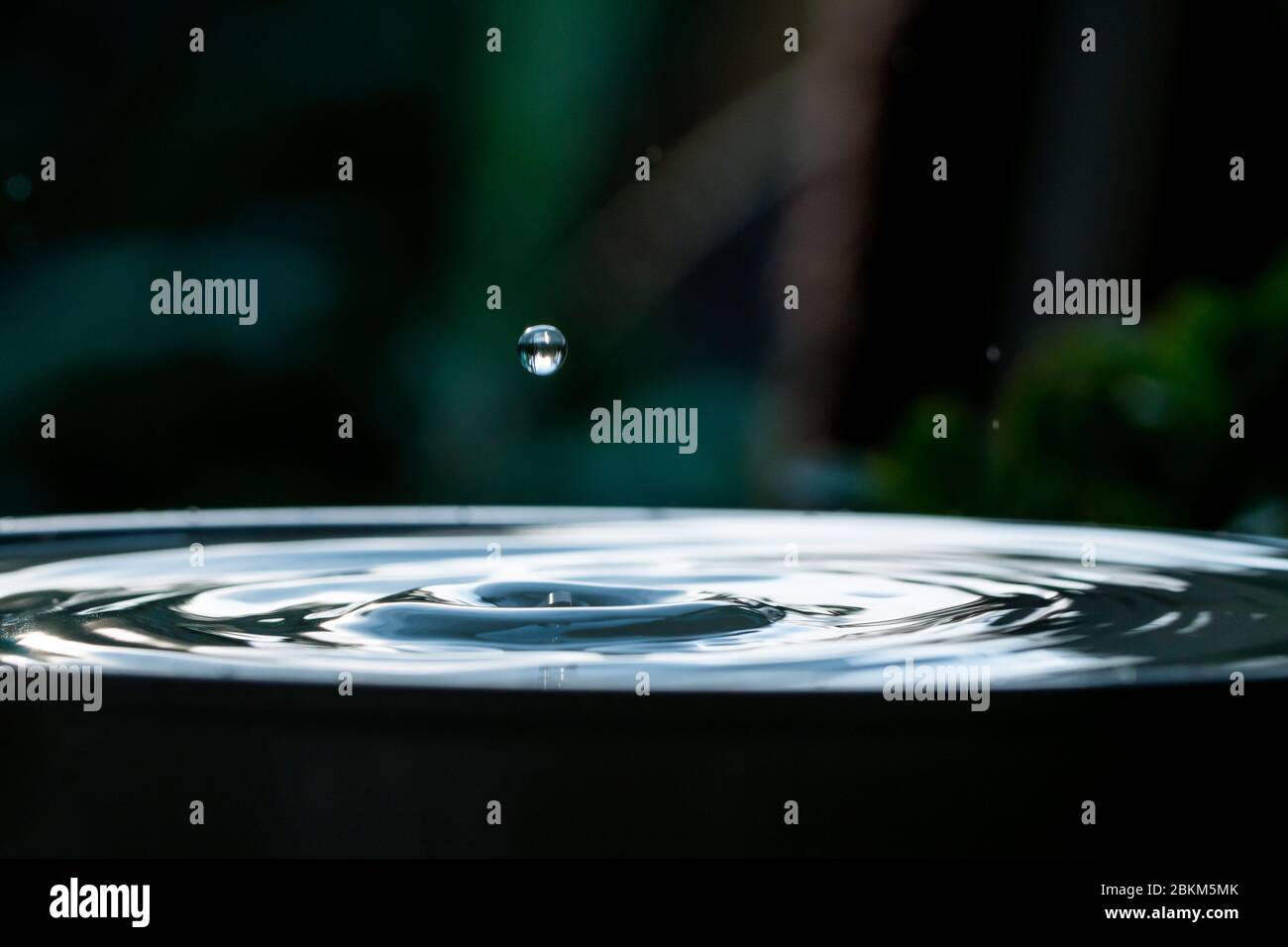 Water Drop splash with sun Stock Photo - Alamy