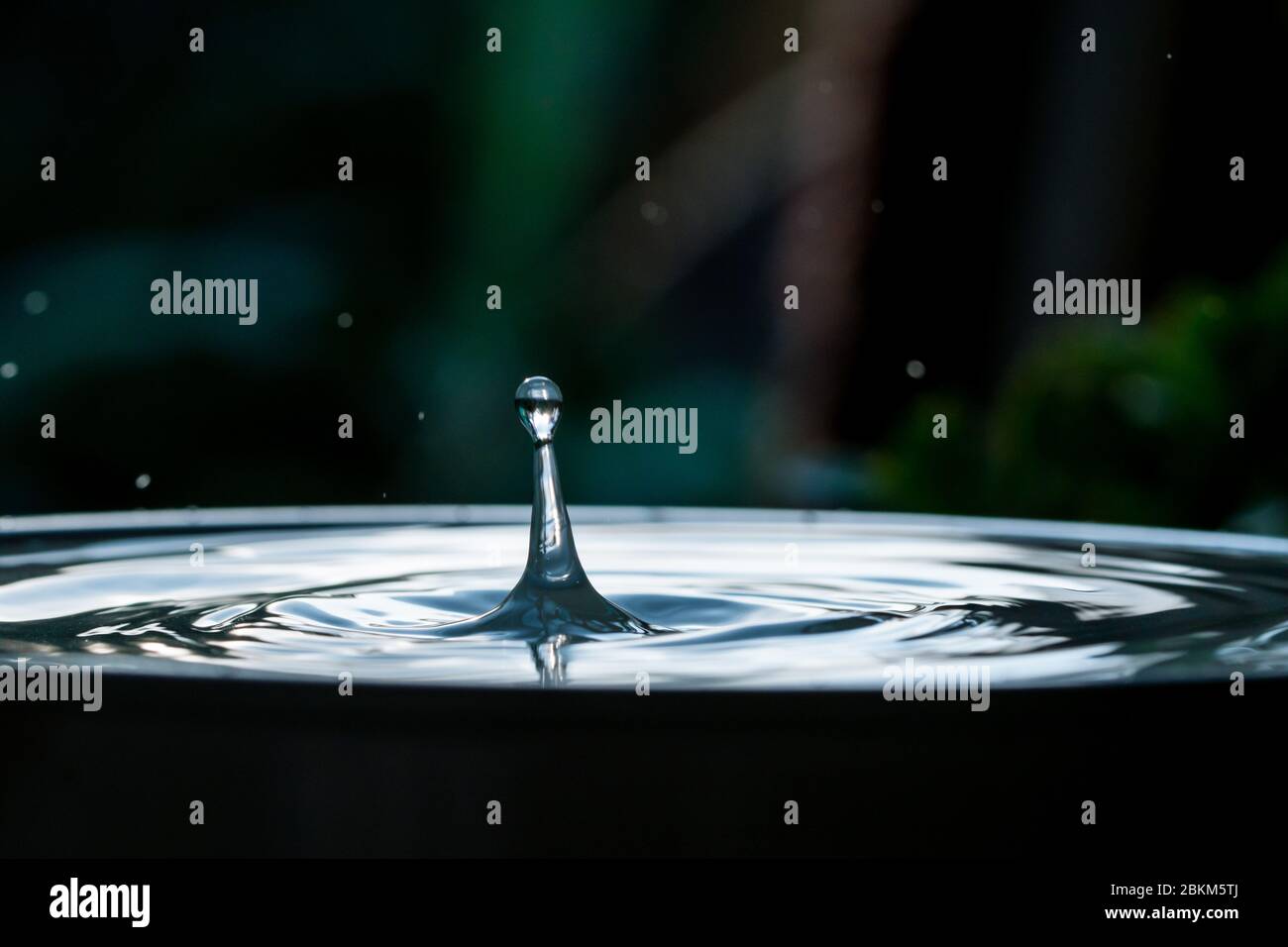 Water Drop splash with sun Stock Photo - Alamy