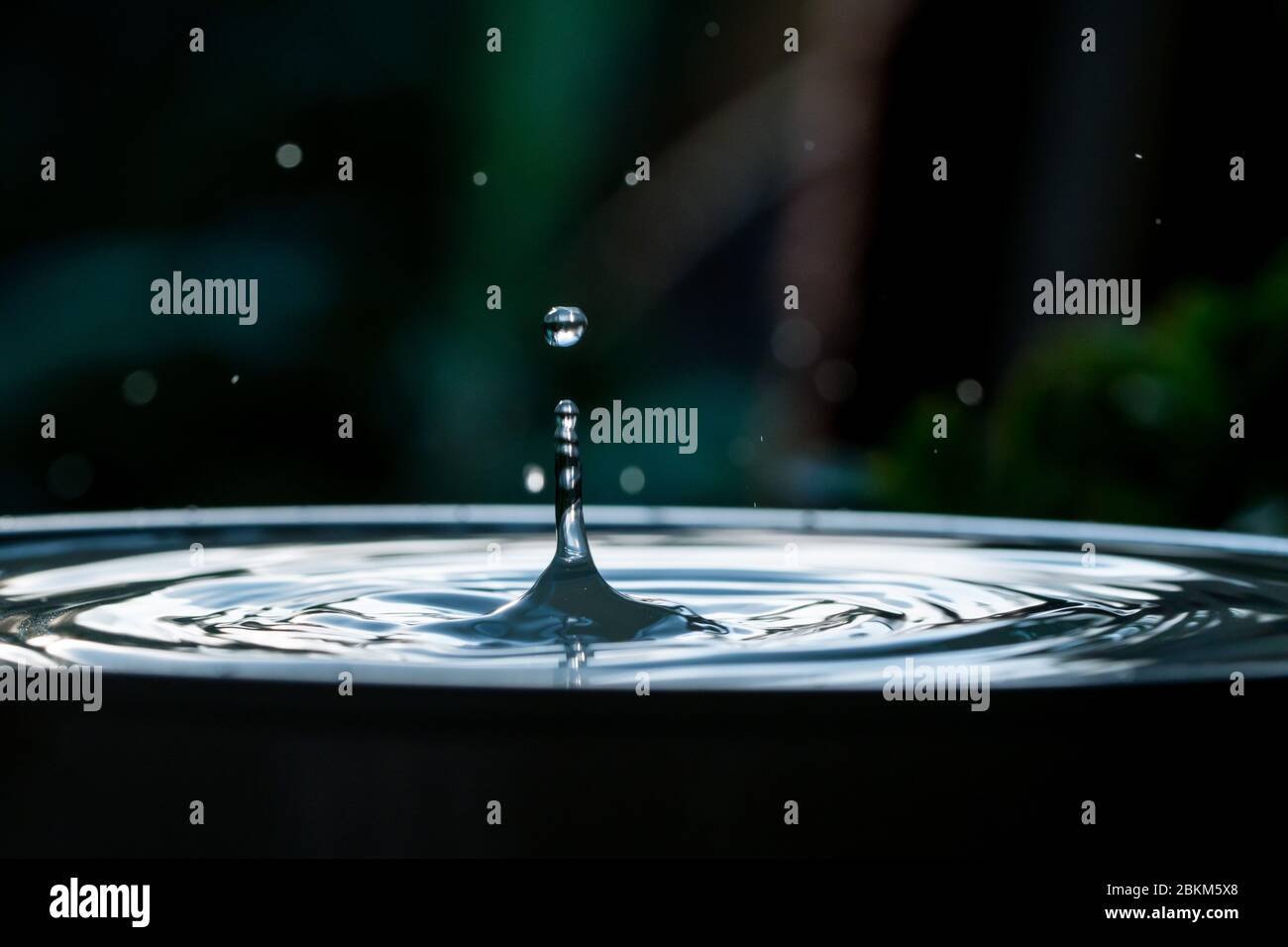 Water Drop splash with sun Stock Photo - Alamy