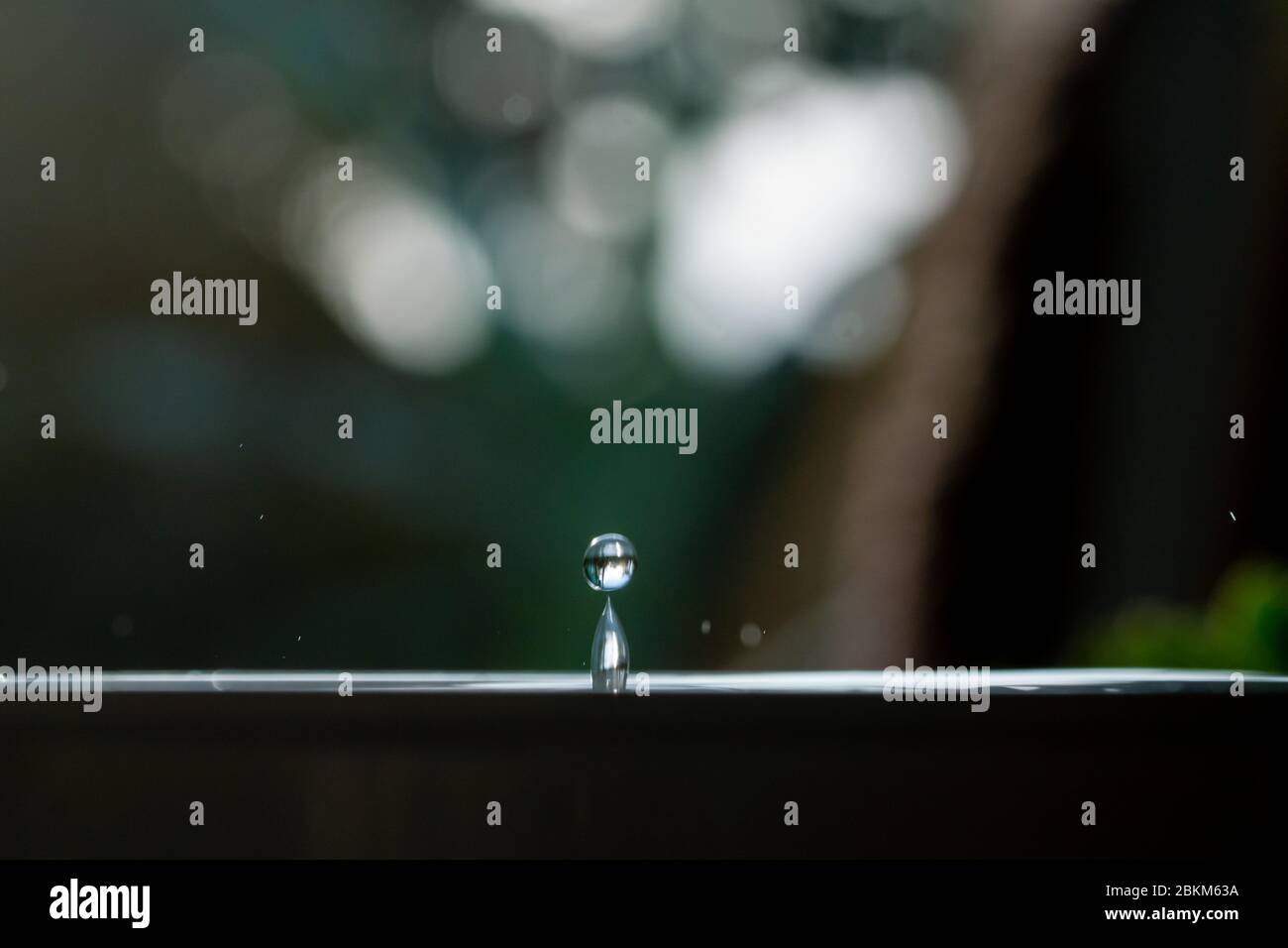 Water Drop splash with sun Stock Photo - Alamy
