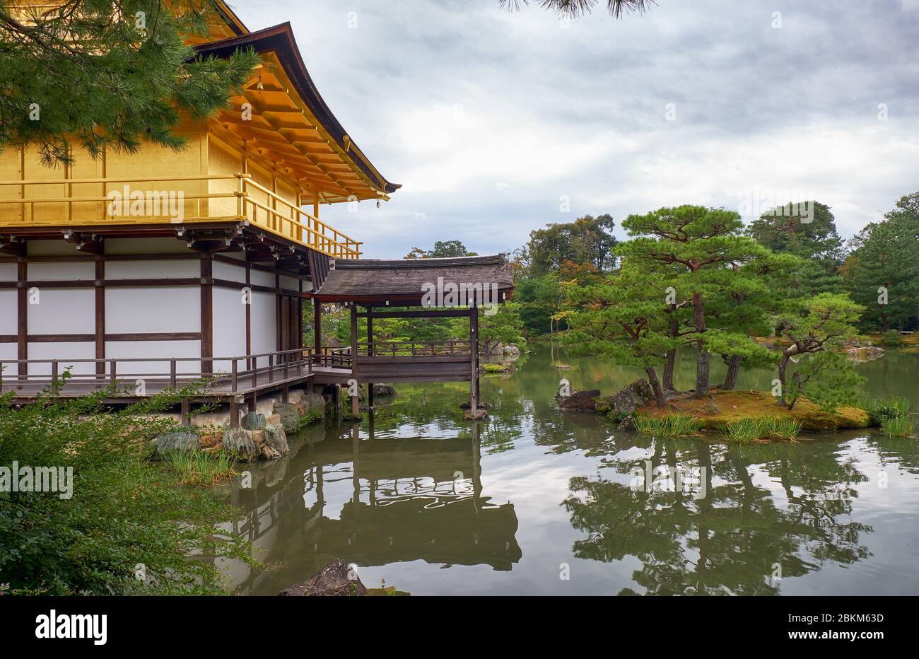 The Golden Pavilion on the shore of Mirror lake with Dekame (leaving ...