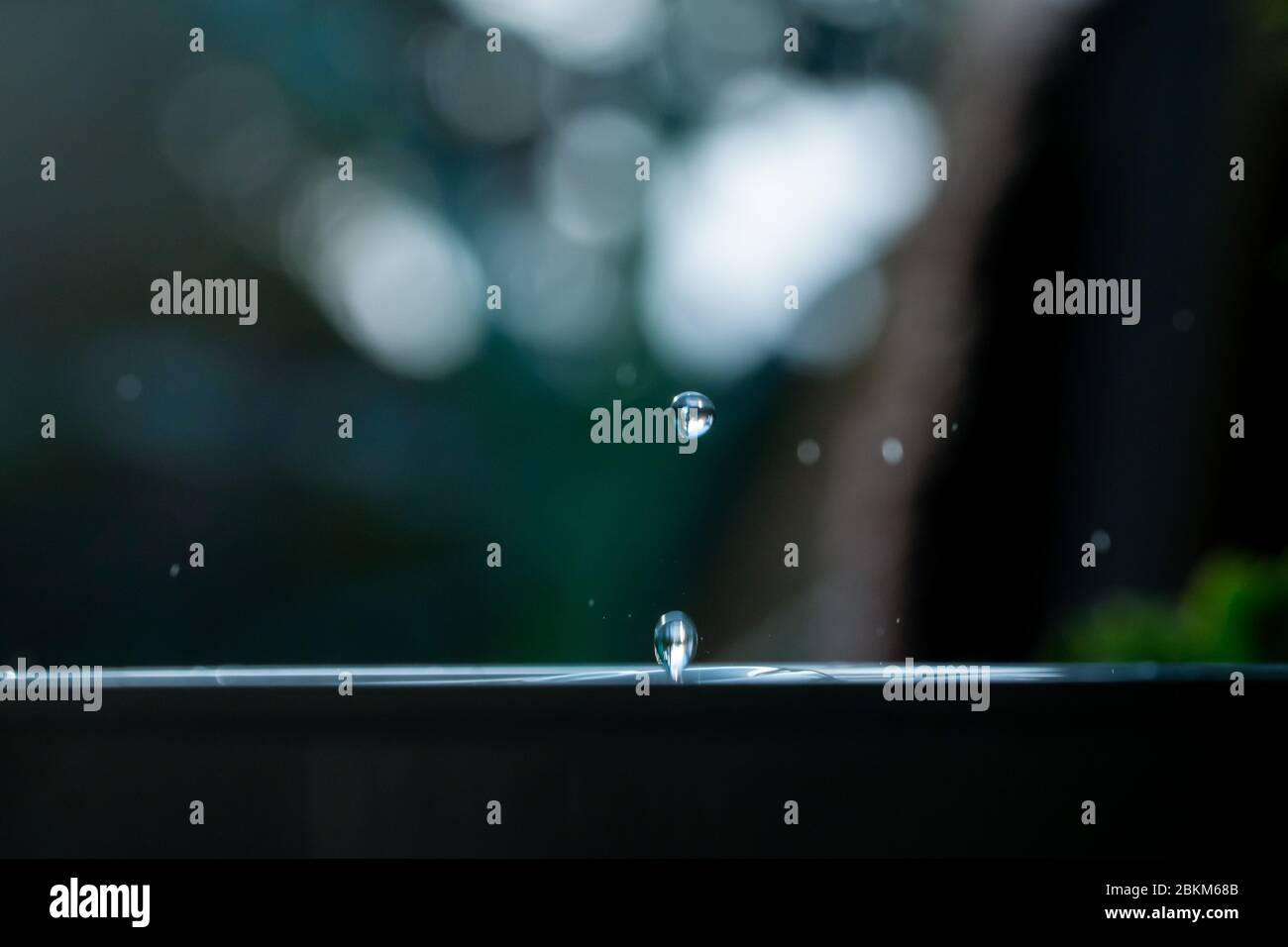 Water Drop splash with sun Stock Photo - Alamy