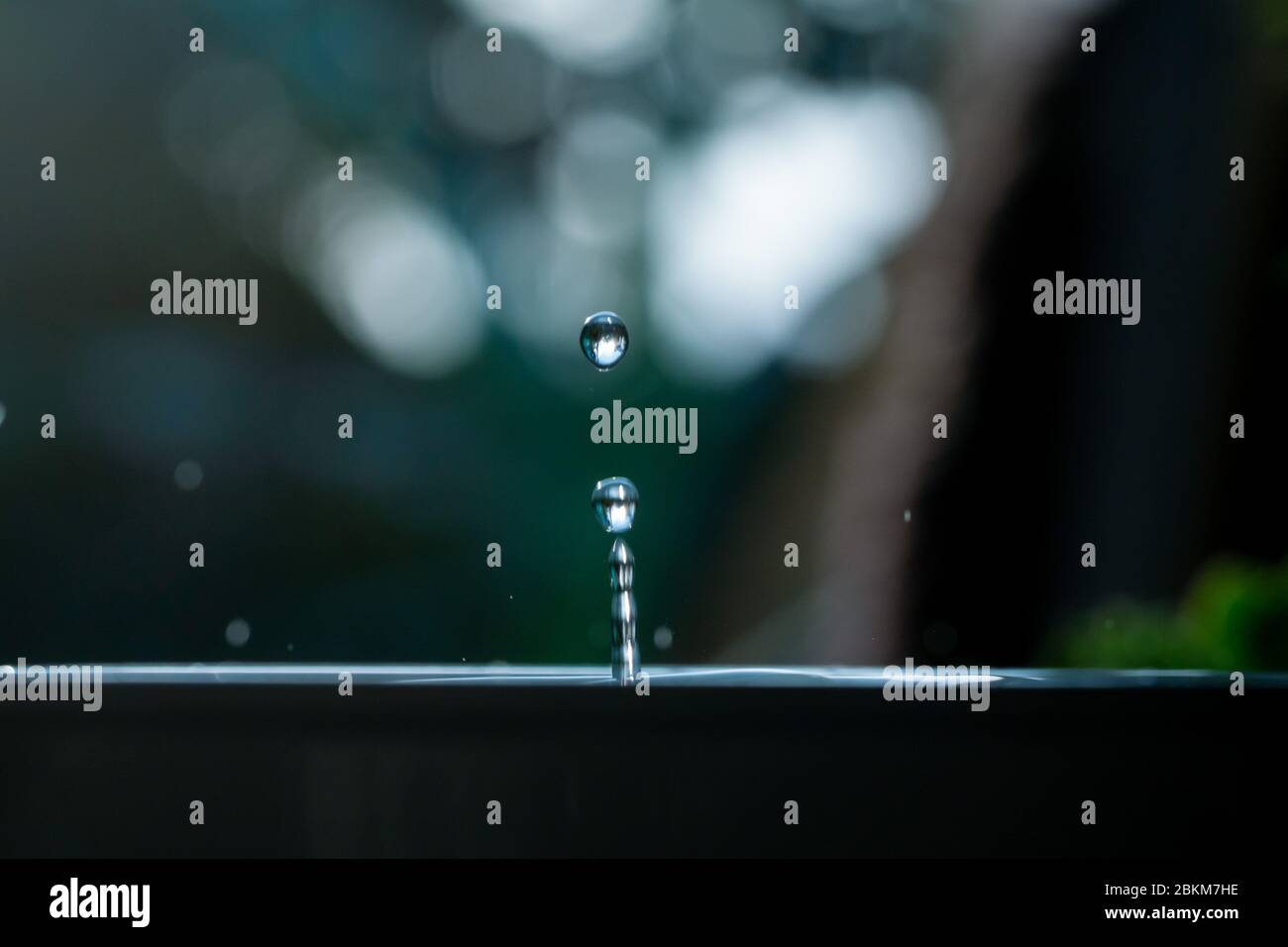 Water Drop splash with sun Stock Photo - Alamy
