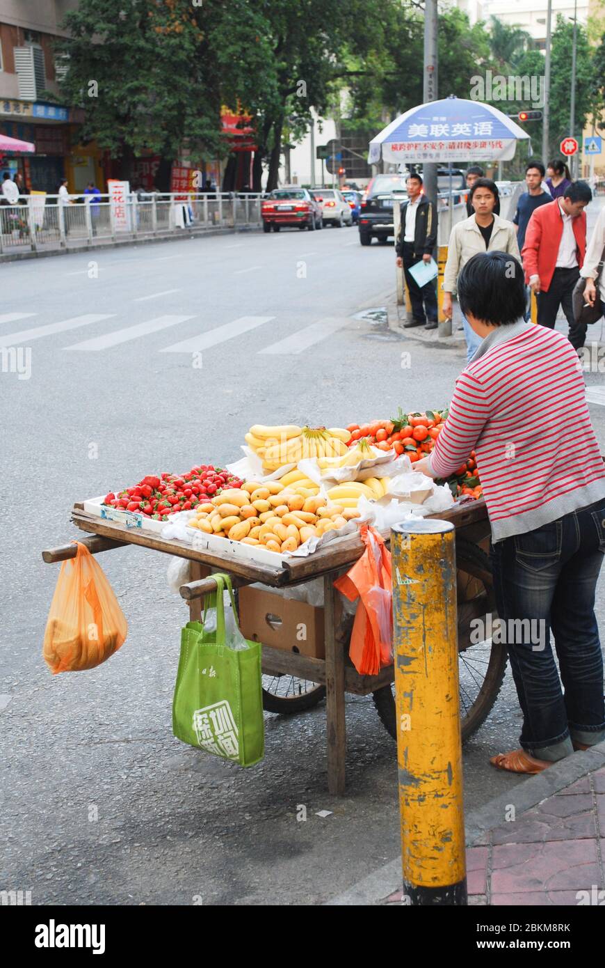 Food Market Trader in Hong Kong Stock Photo - Alamy