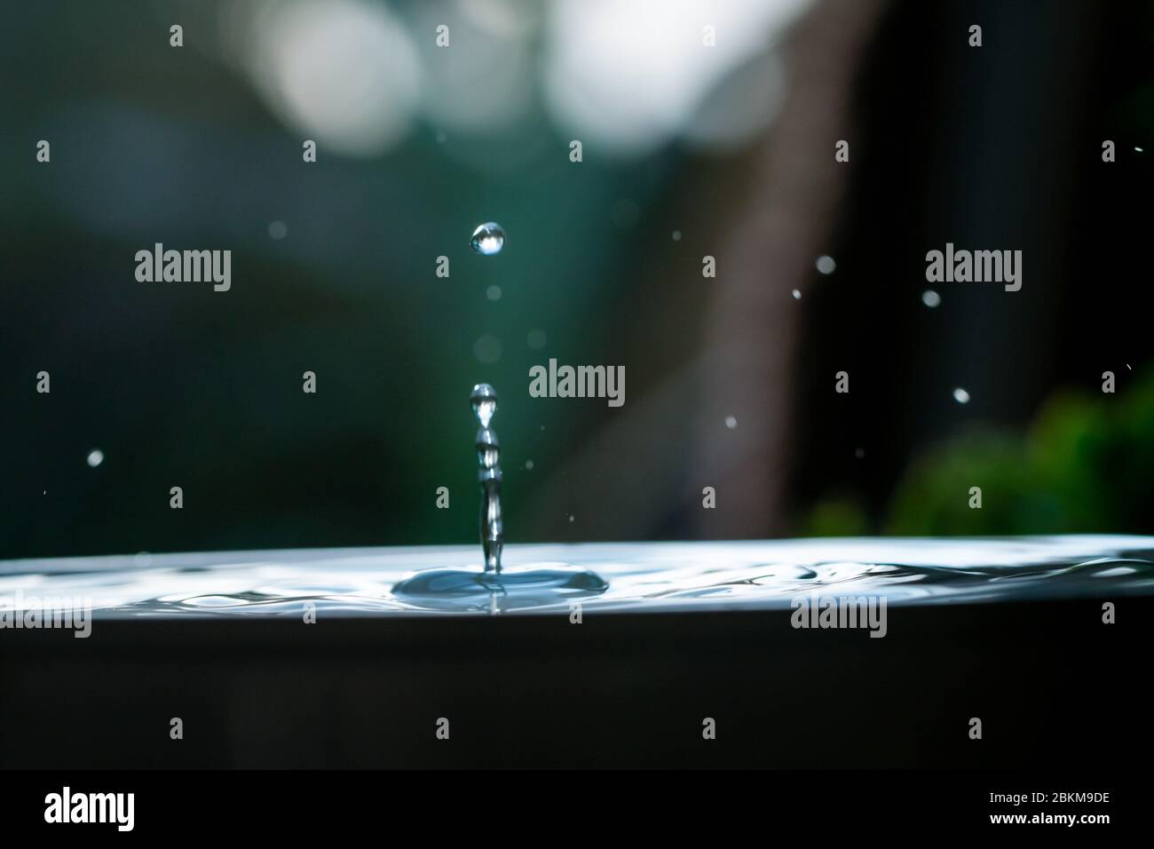Water Drop splash with sun Stock Photo - Alamy