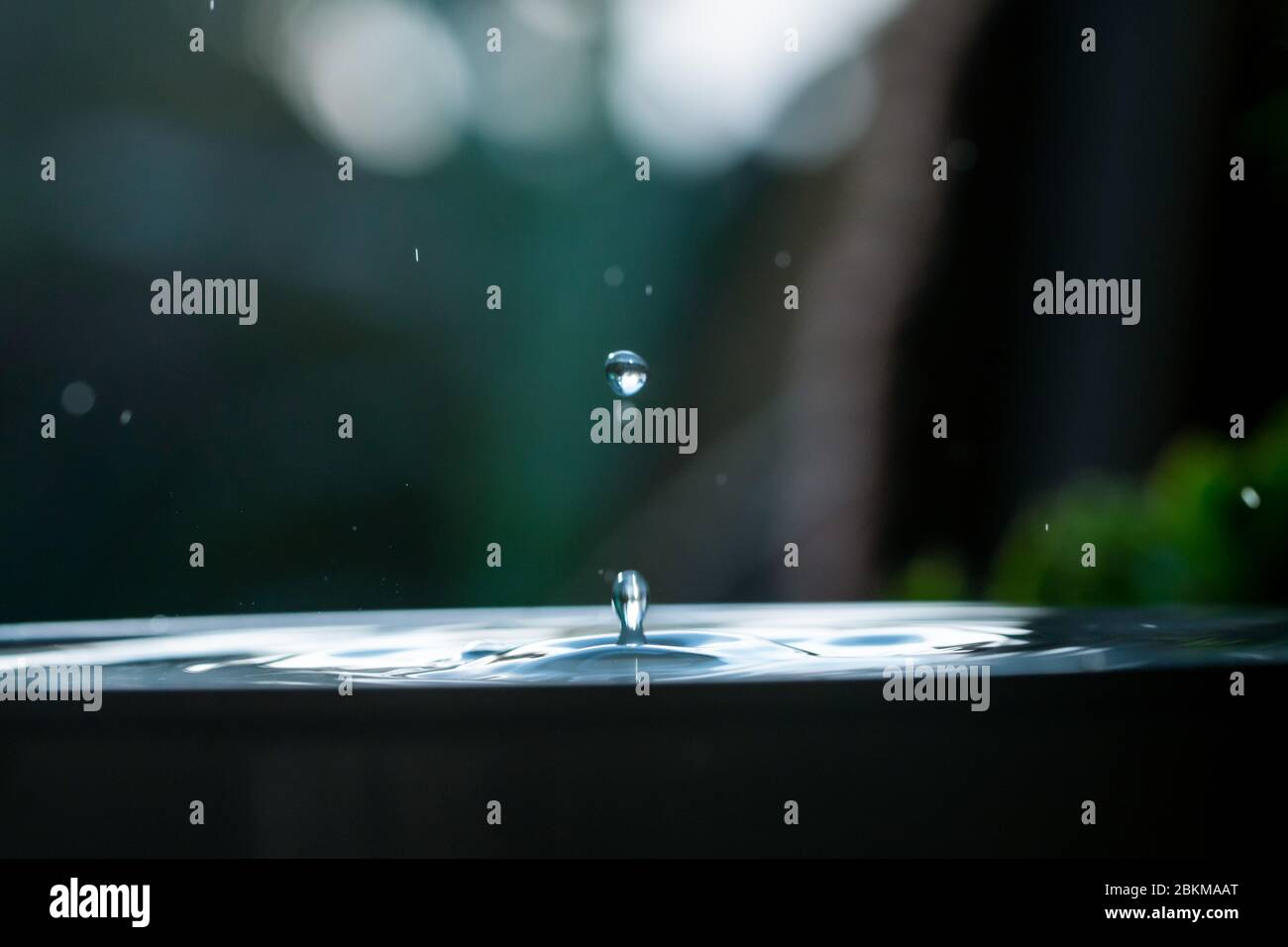 Water Drop splash with sun Stock Photo - Alamy