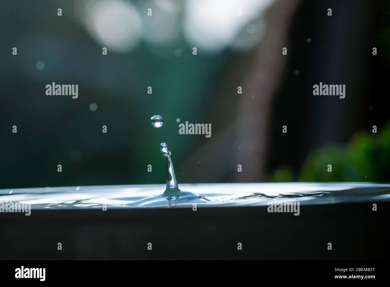Water Drop splash with sun Stock Photo - Alamy